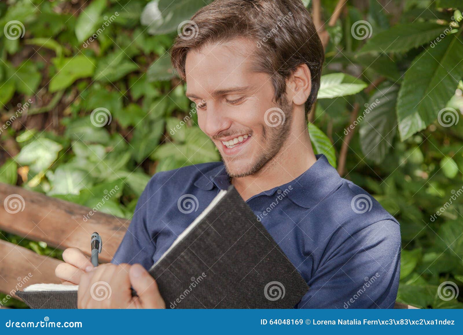 Man writing in the park stock image. Image of recreation - 64048169