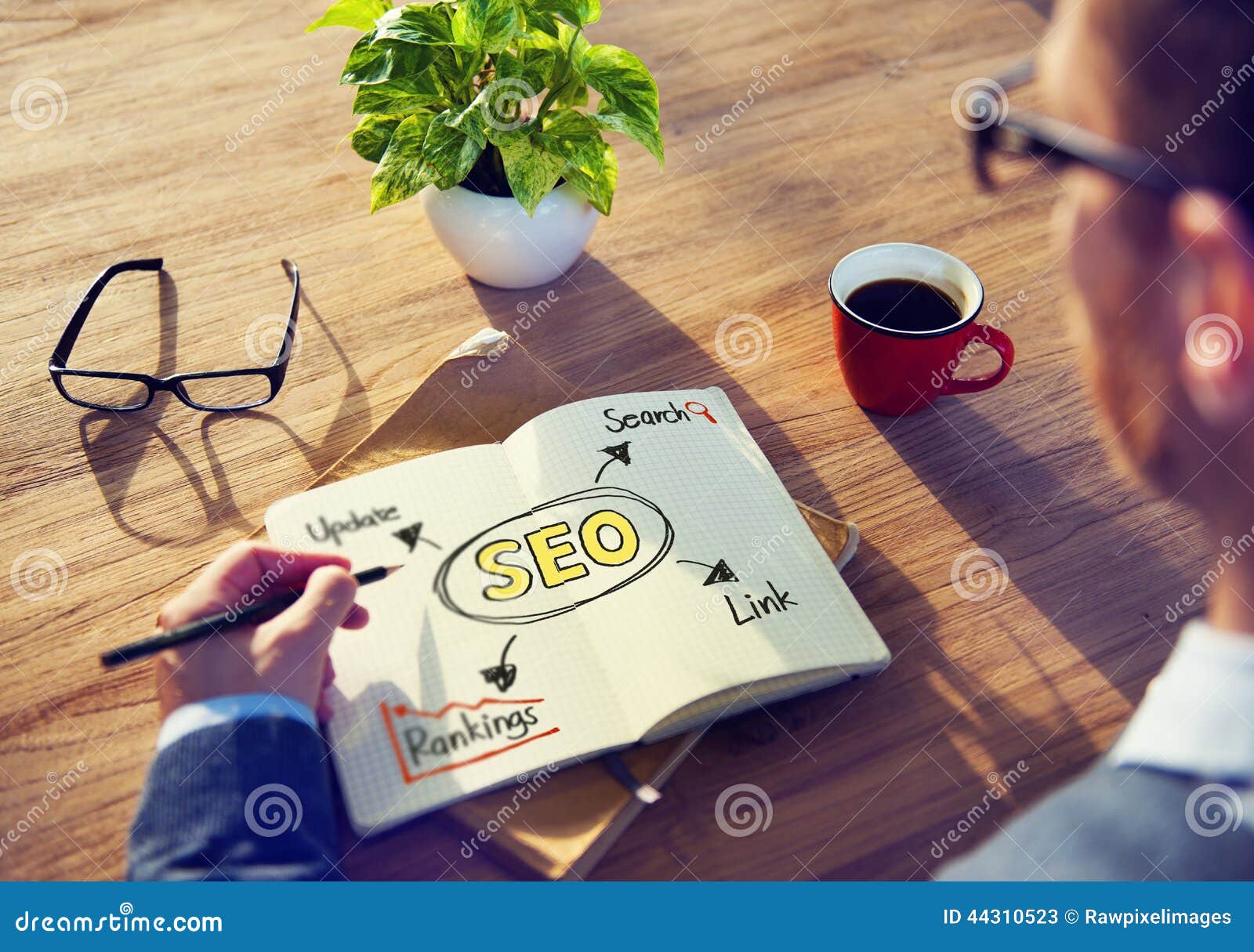 A Man Writing SEO Concepts on His Note Stock Image - Image of page ...