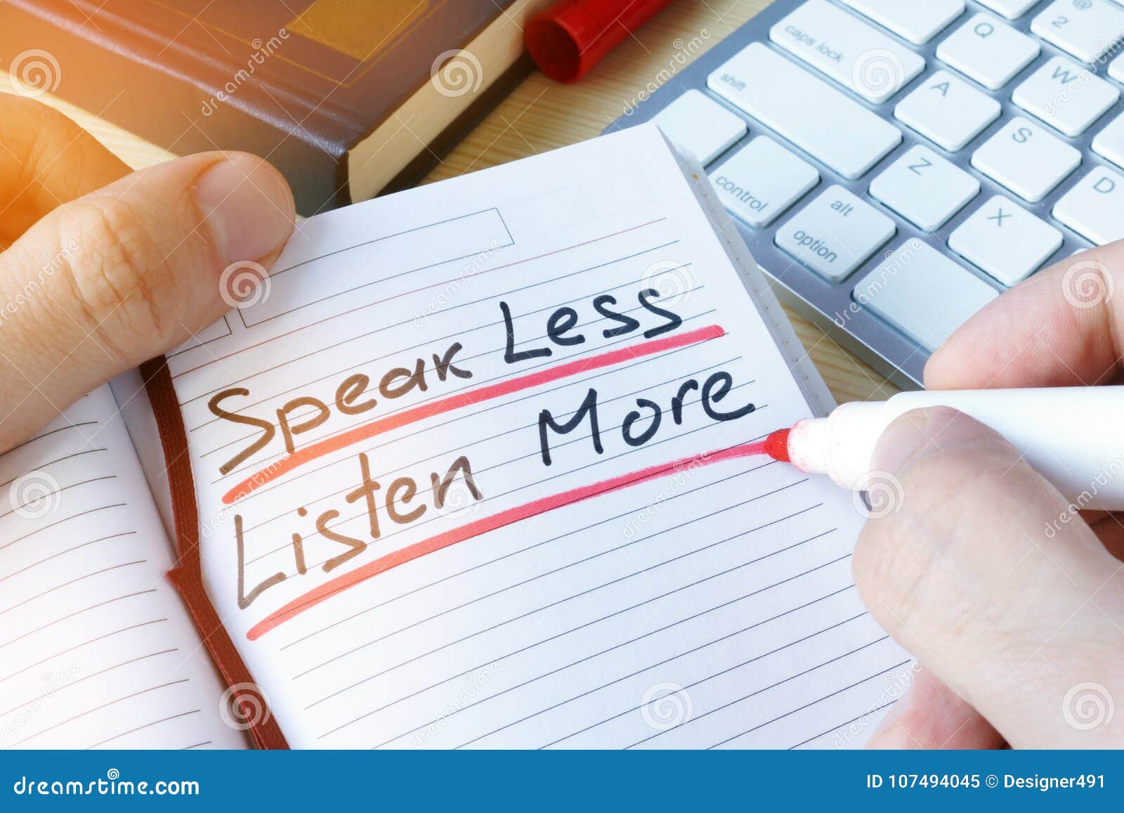 Man Writing Speak less Listen More. Stock Image - Image of ...