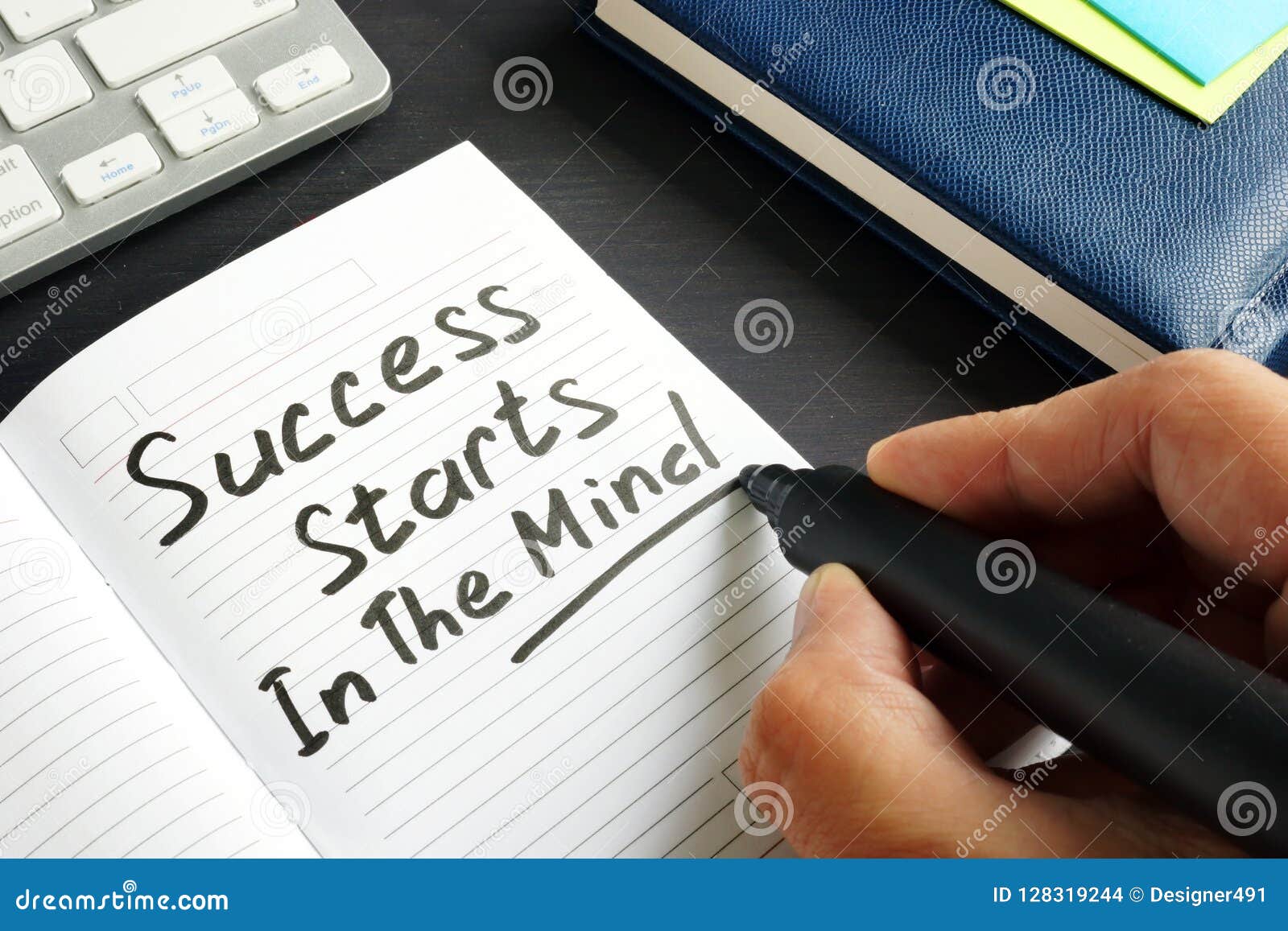 Man is Writing Success Starts in the Mind in a Note. Stock Photo ...