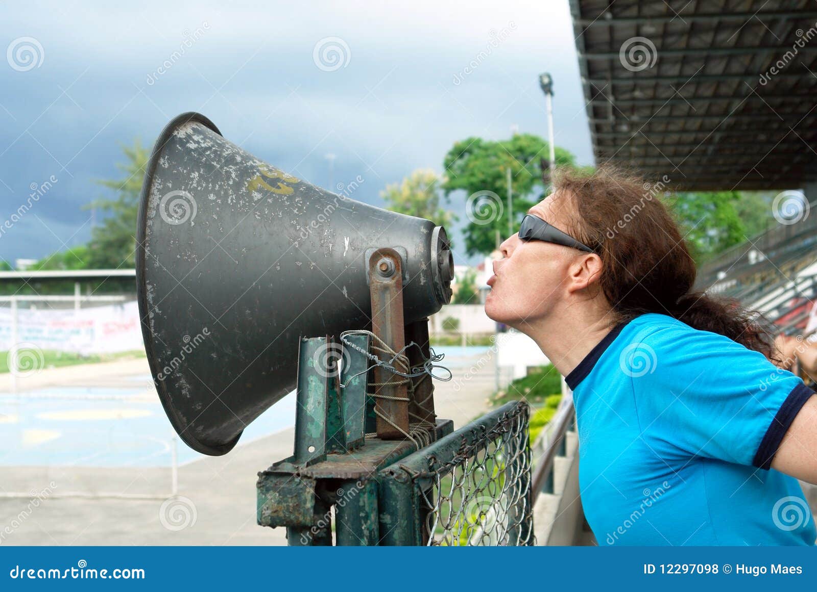 Man yelling thru horn stock photo. Image of loudspeaker - 12297098