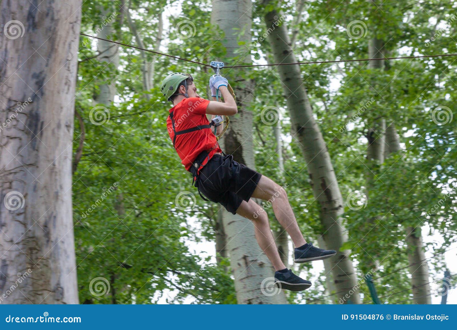 Man on Zipline in Adventure Park Stock Photo - Image of climbing ...