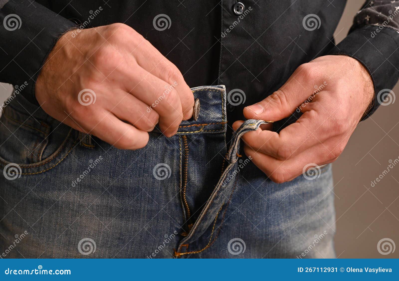 The man zips up his pants stock image. Image of problem - 267112931