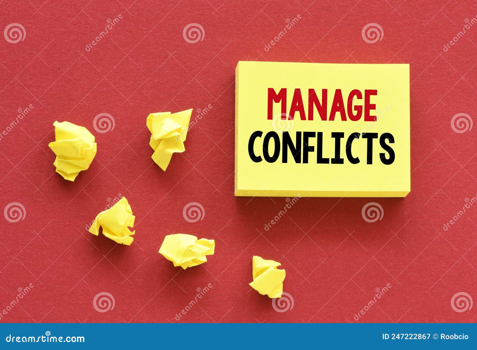 MANAGE CONFLICTS Words on a Small Yellow Piece of Paper Stock Image ...