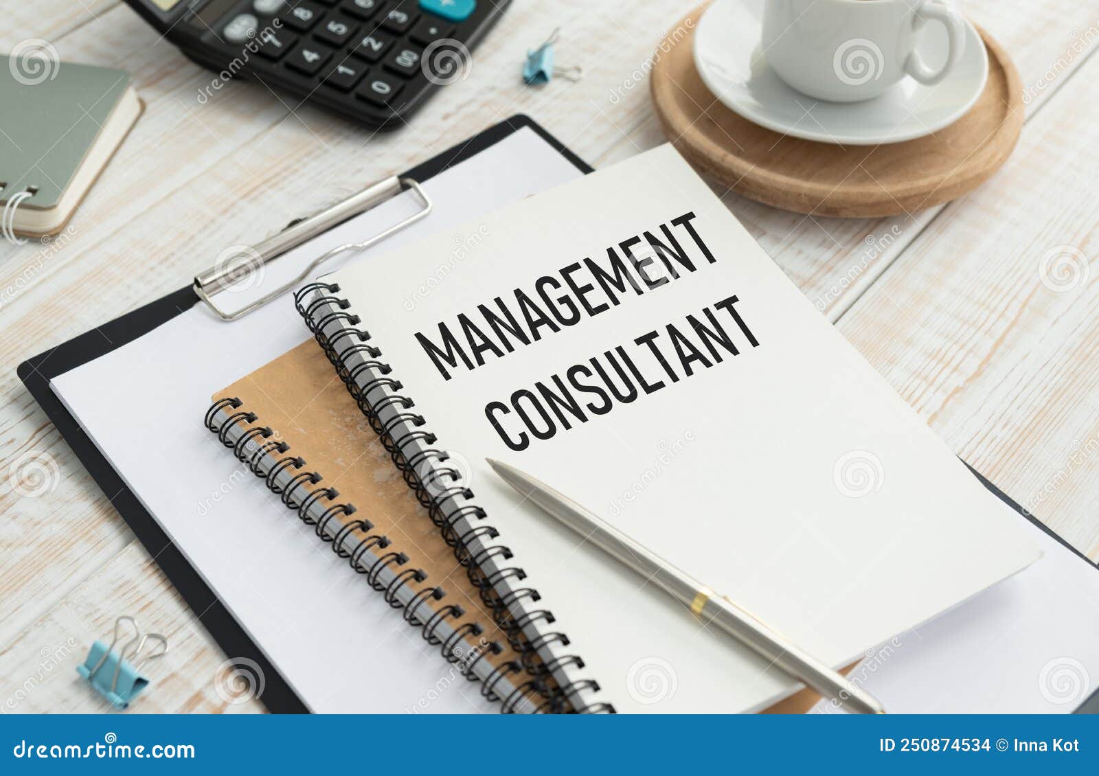 Management Consultant Text Inspirational Quotes on Notepad on Office ...