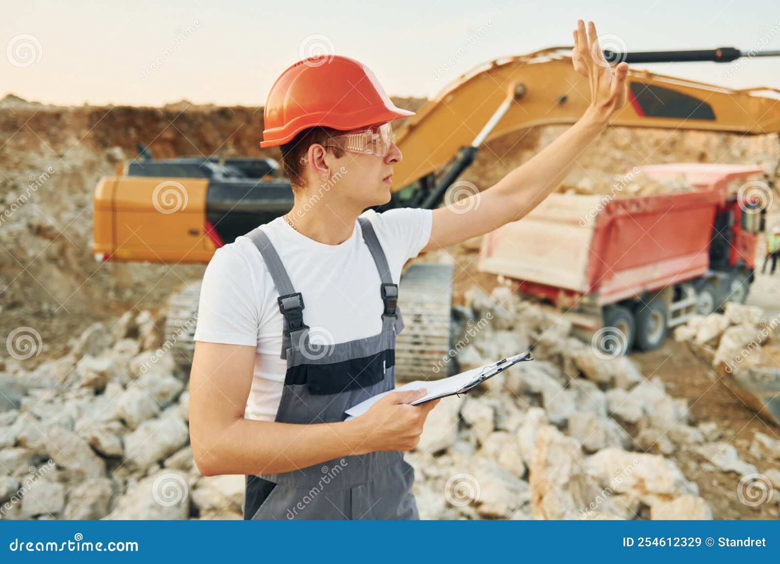 Management of Project. Worker in Professional Uniform is on the Borrow ...