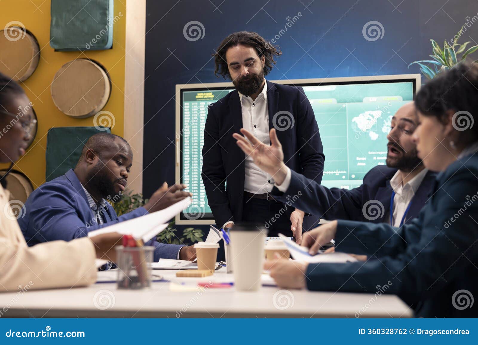 Management Team Evaluating Success and Performance Metrics on ...