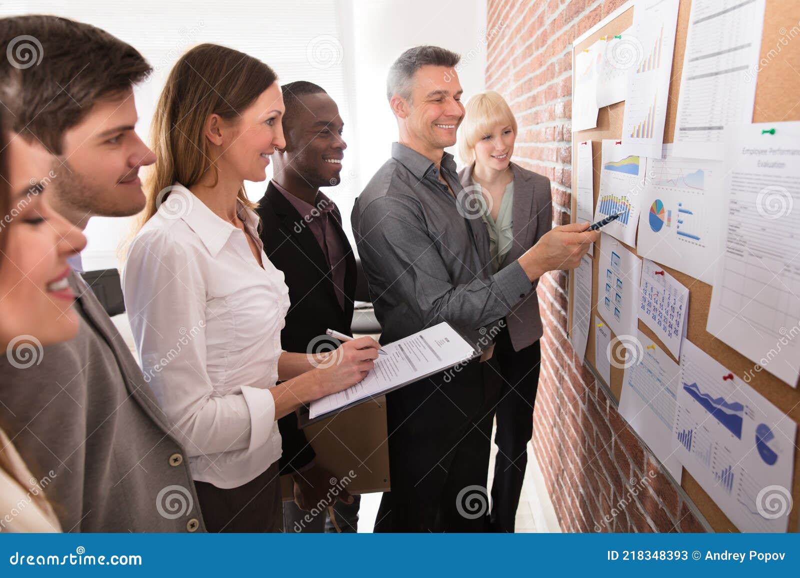 Manager Analyzing the Graph with His Colleague Stock Image - Image of ...