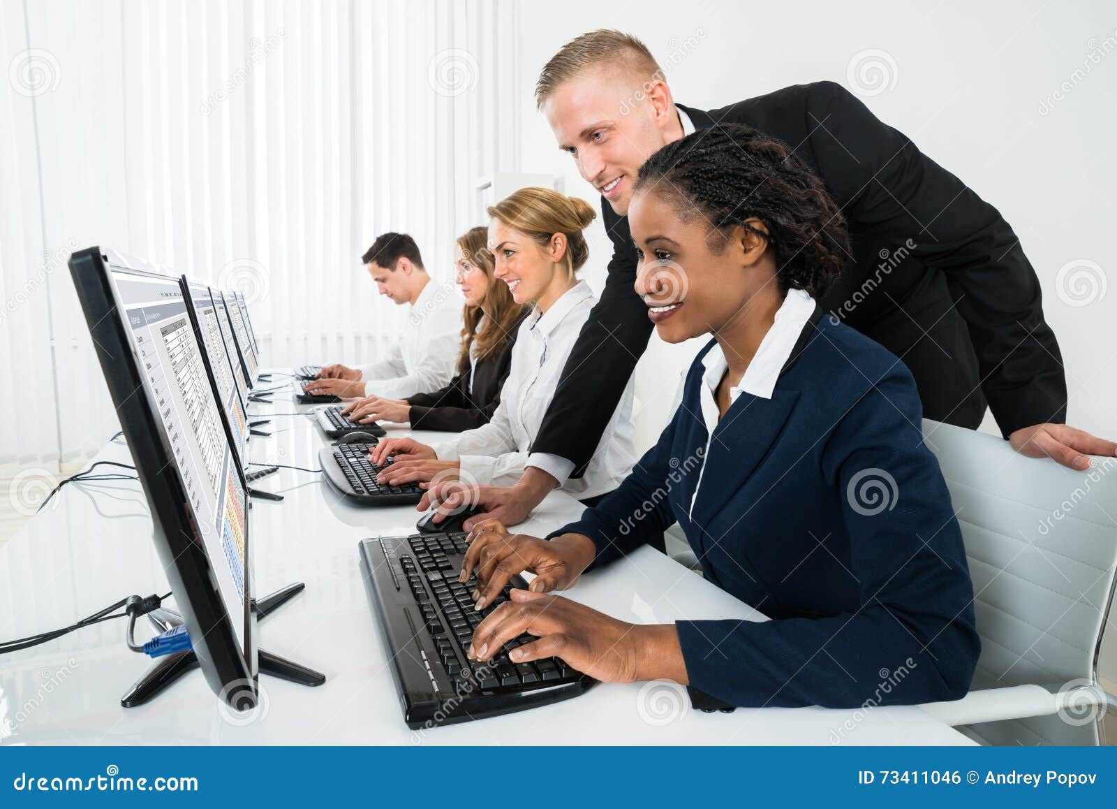 Manager Assisting His Staff in Office Stock Photo - Image of employee ...