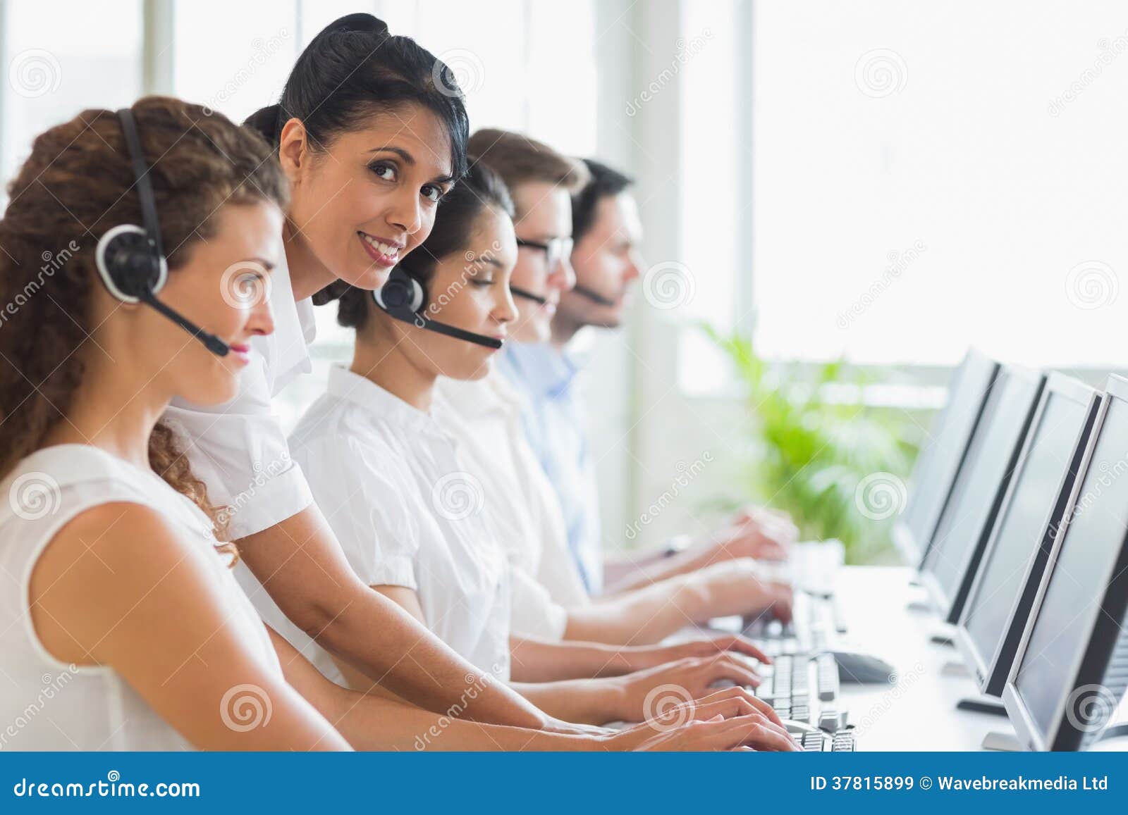 Manager Checking Her Staffs Work in Call Center Stock Image - Image of ...