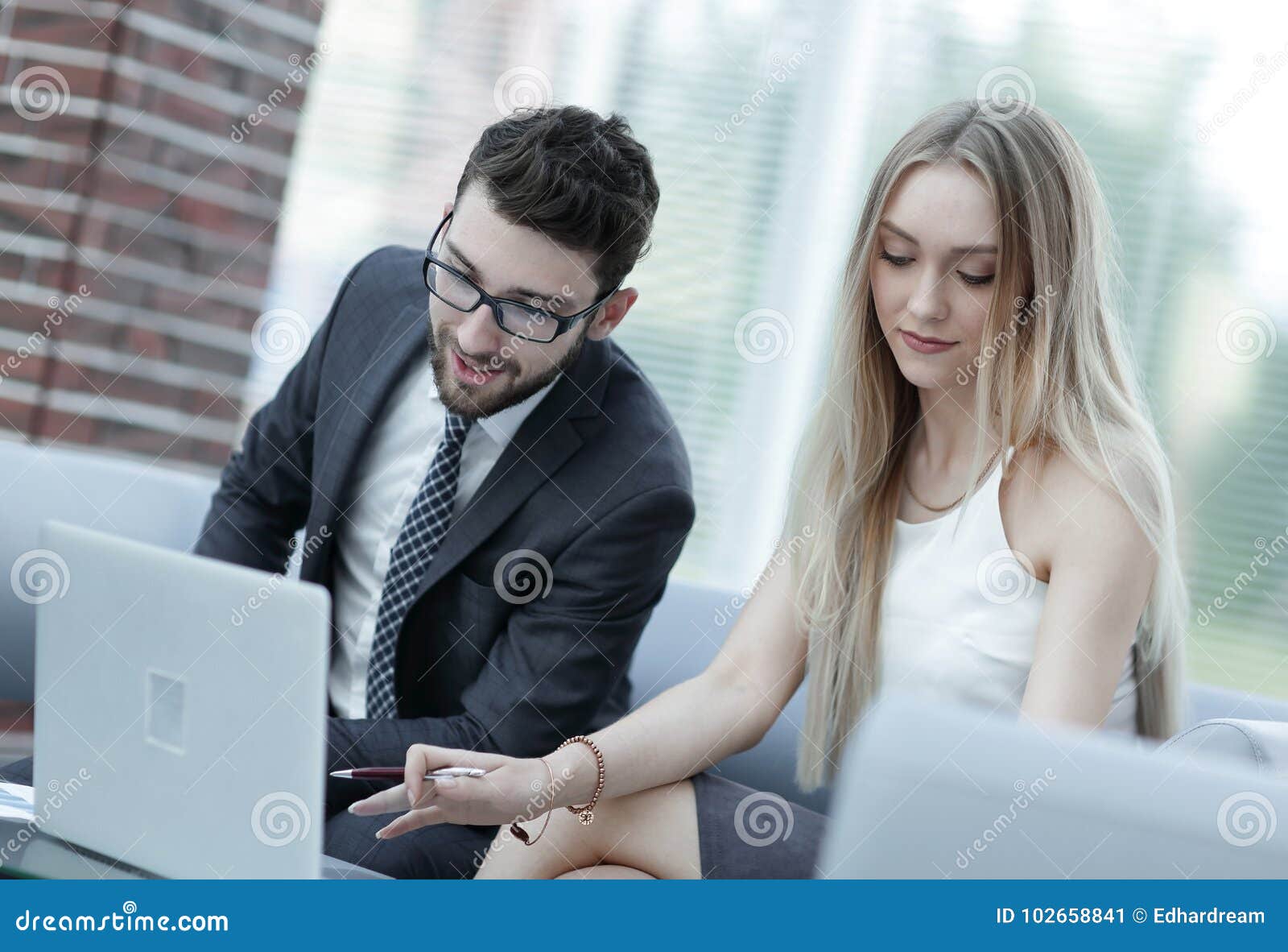 Manager and Client Browsing Information on the Laptop. Stock Image ...
