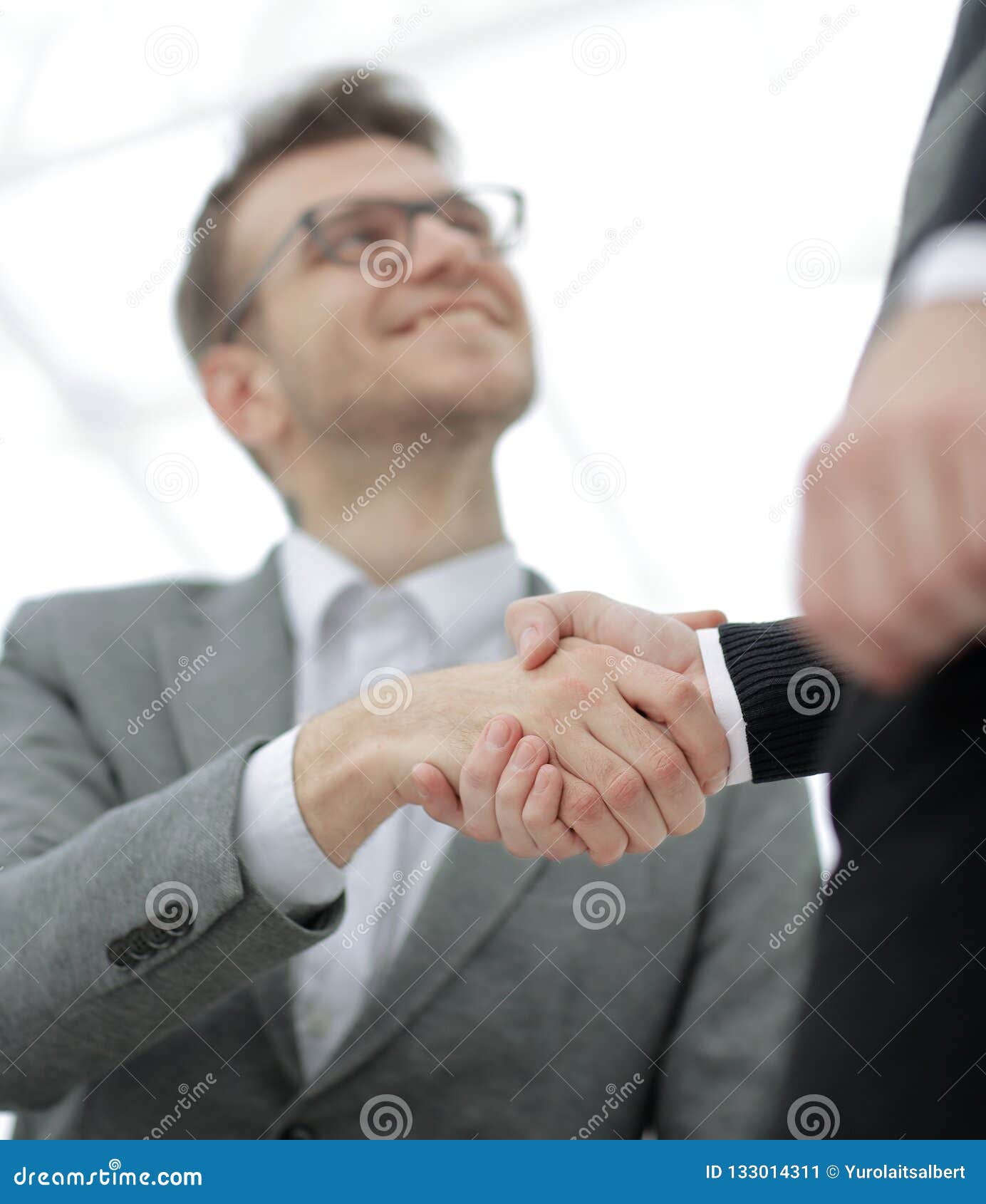 Manager and the Client Shake Hands when Meeting in the Office Stock ...