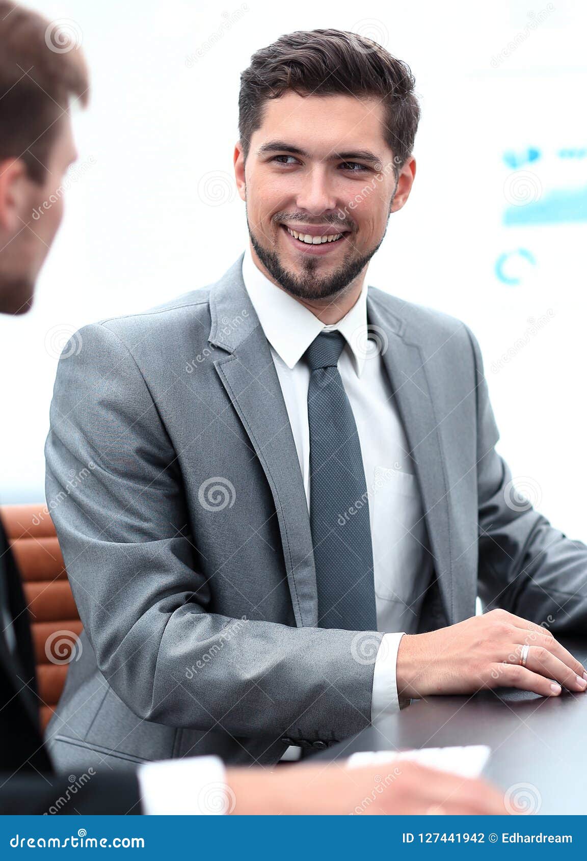 Manager with the Colleague Sitting at the Desk Stock Photo - Image of ... Manager with the Colleague Sitting at the Desk Stock Photo - Image of ...