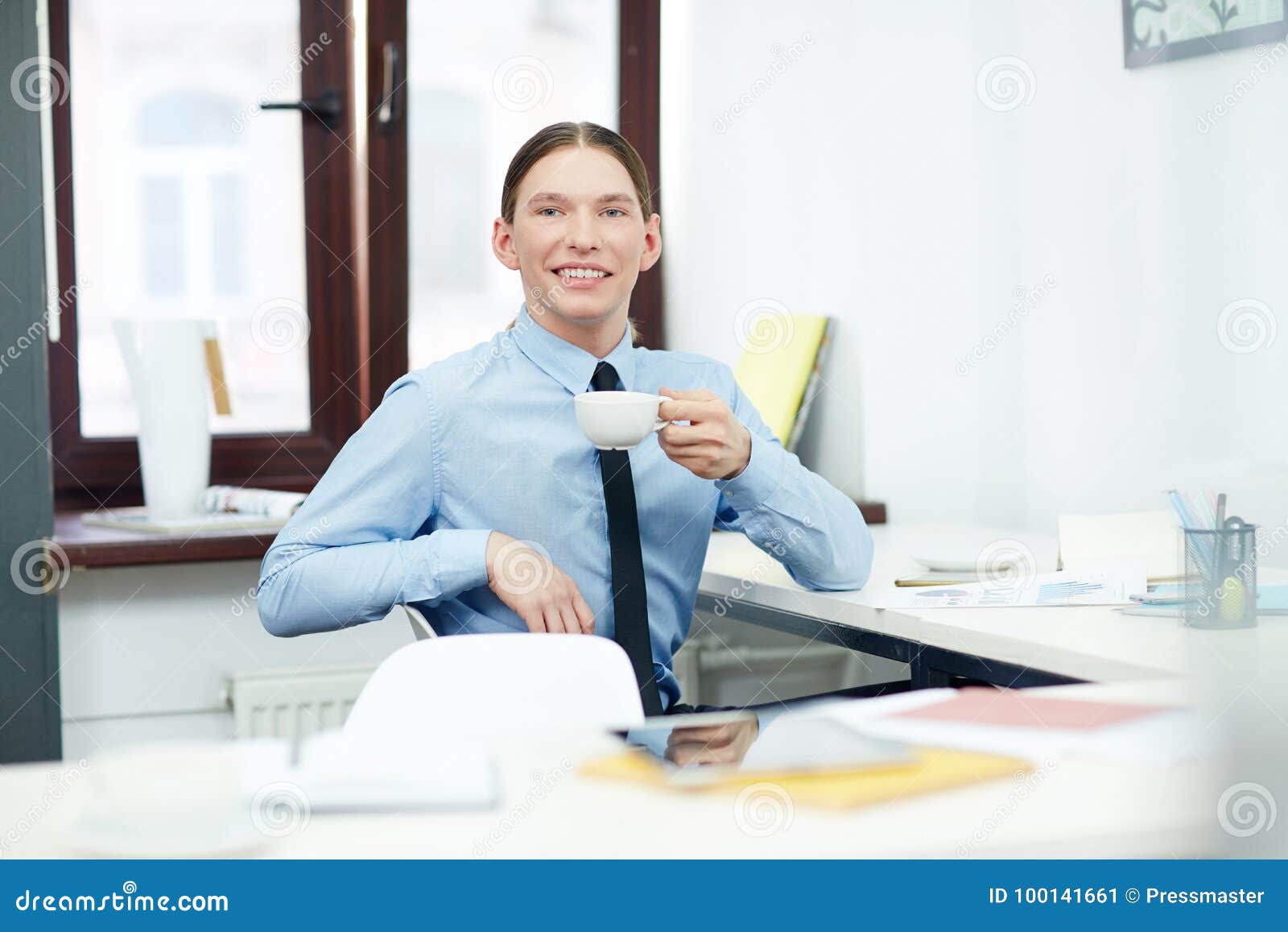Manager with cup of tea stock image. Image of professional - 100141661