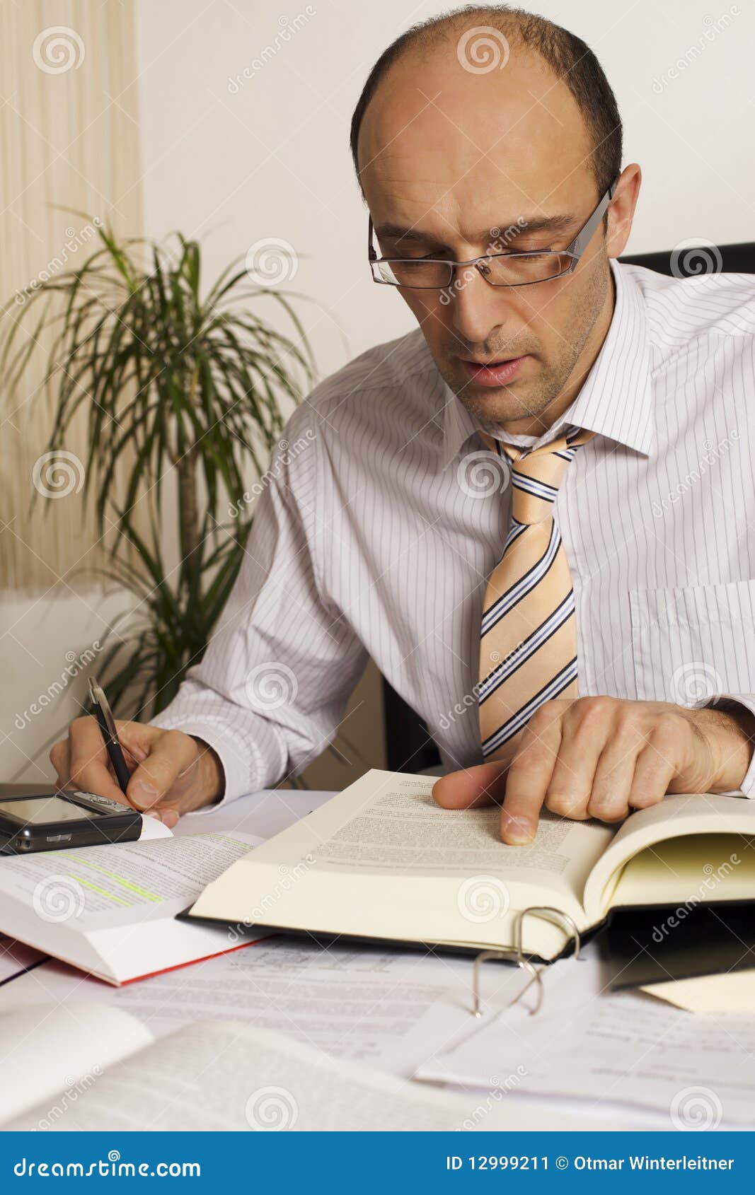Manager at desk working stock image. Image of outfit - 12999211