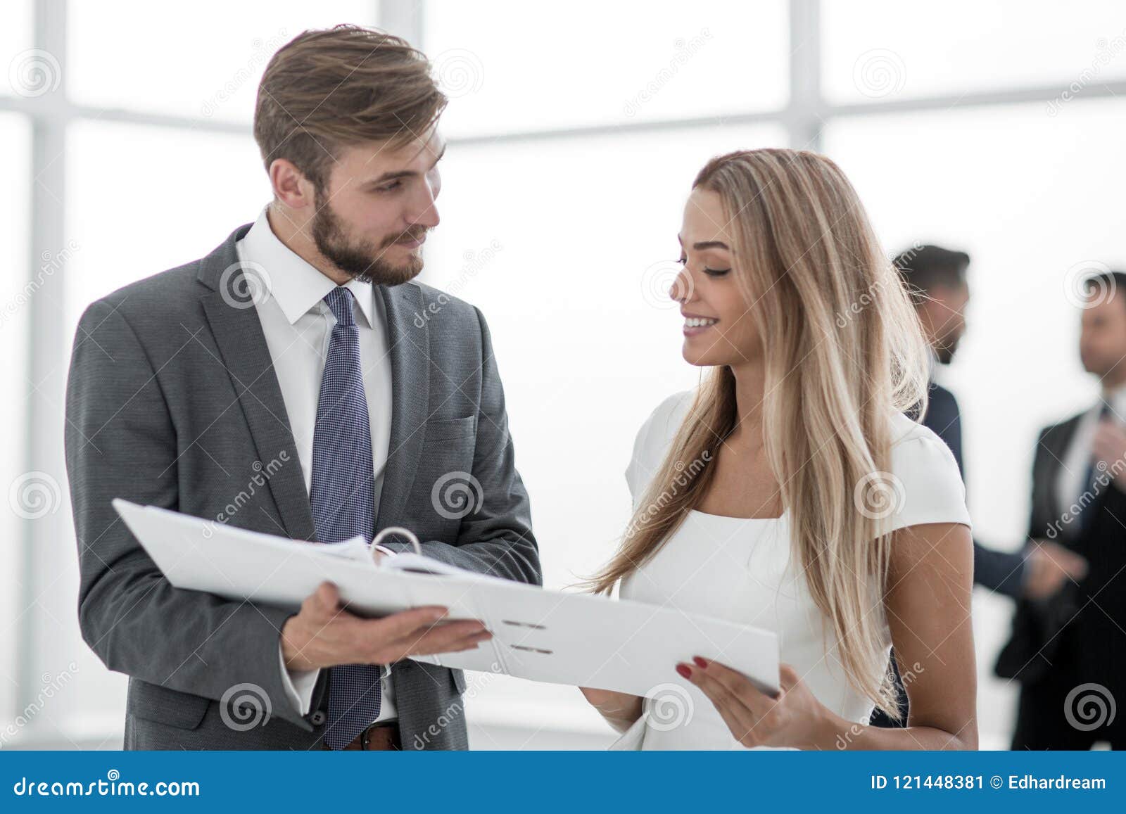Manager Discussing with the Client the Business Document Stock Image ...