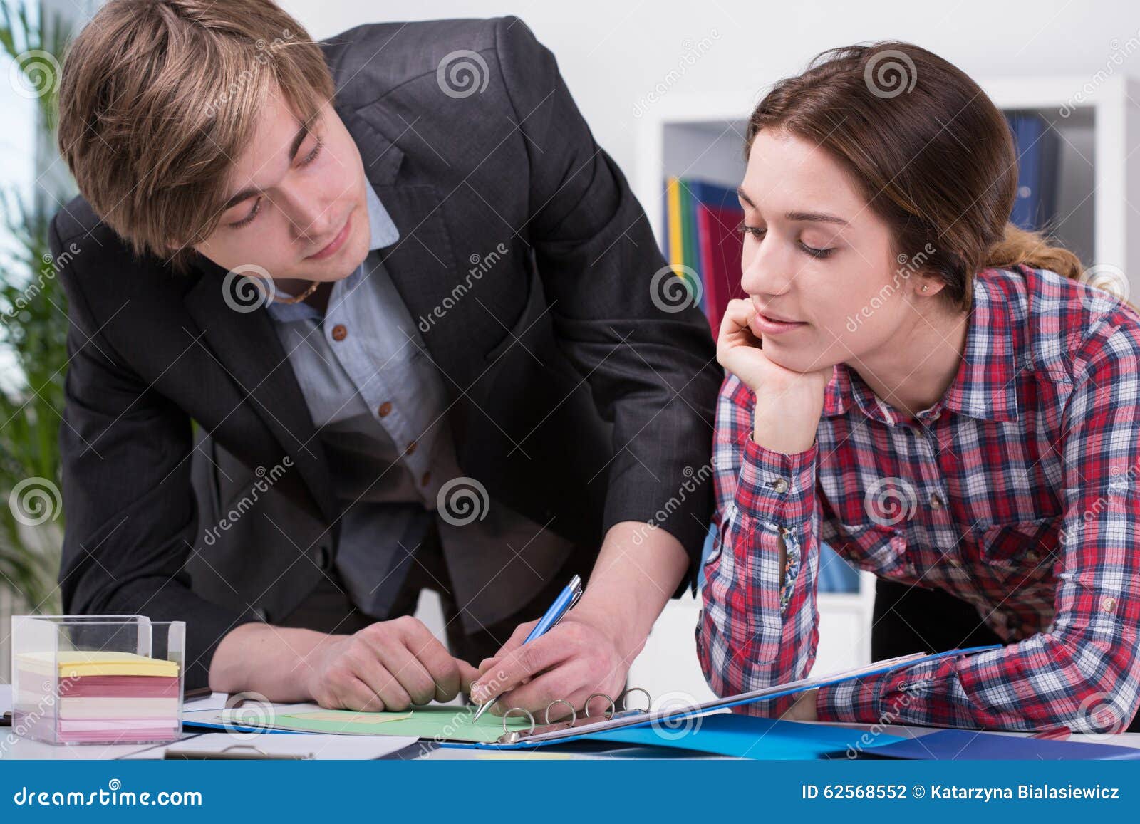 Manager and Employee Sharing Ideas Stock Photo - Image of papers, notes ...
