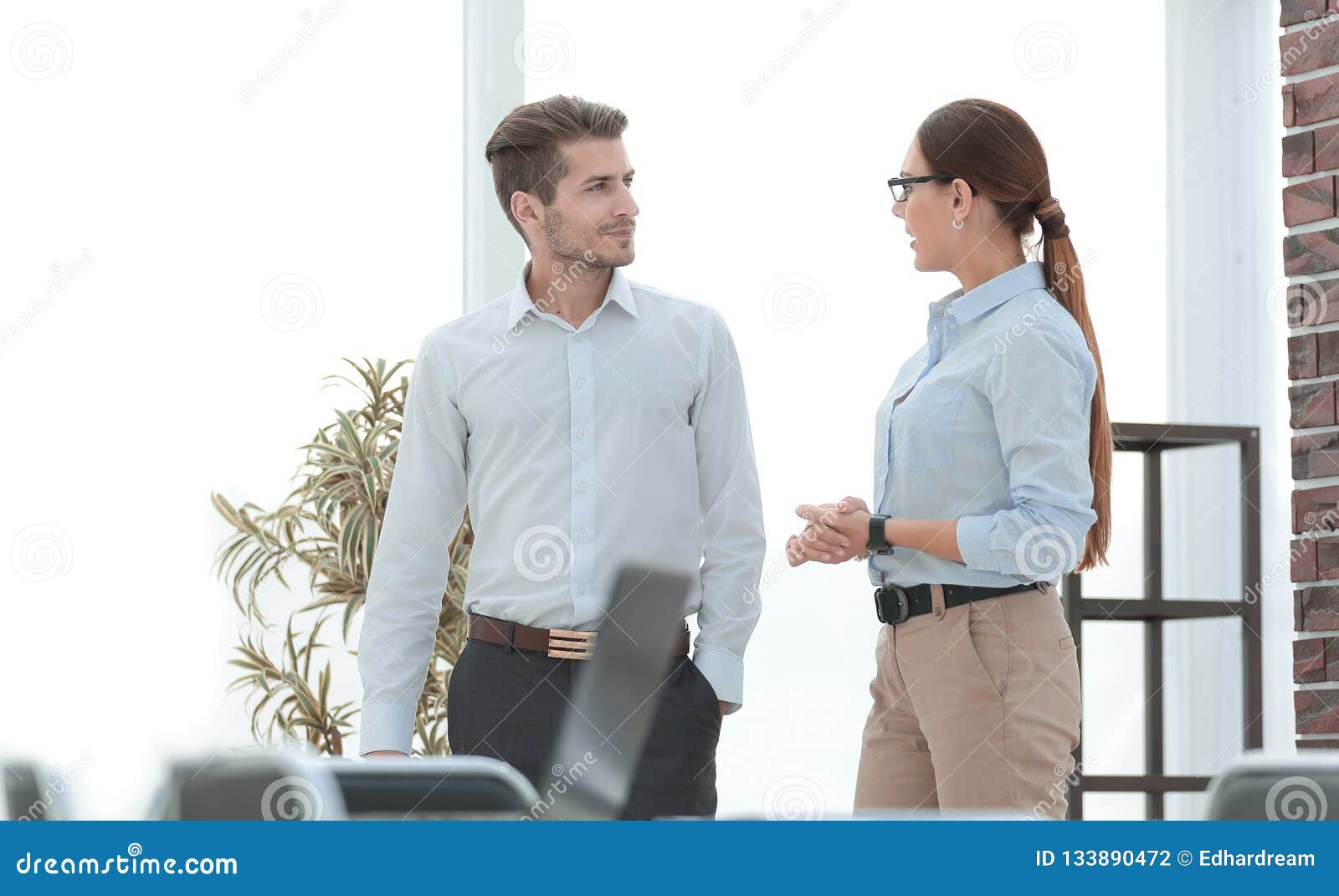 Manager and Employee Talking Standing in the Office Stock Photo - Image ...