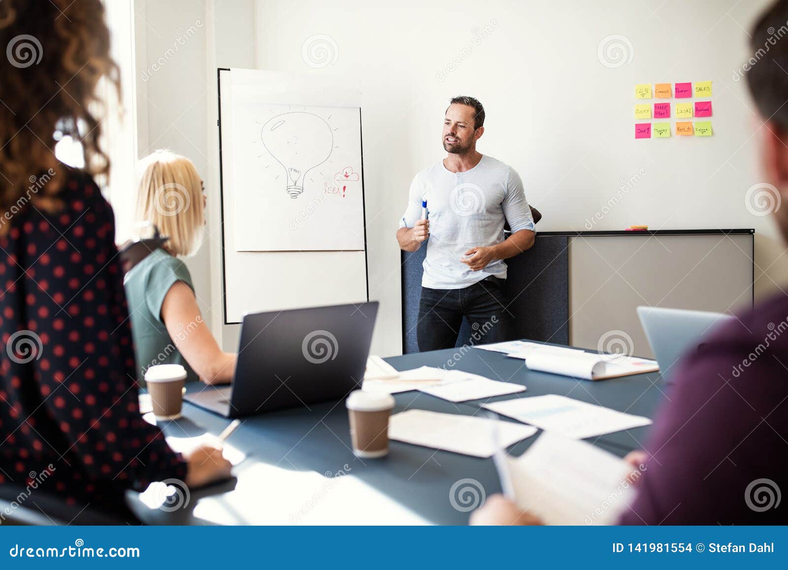 Manager Giving a Presentation To His Team in an Office Stock Photo ...