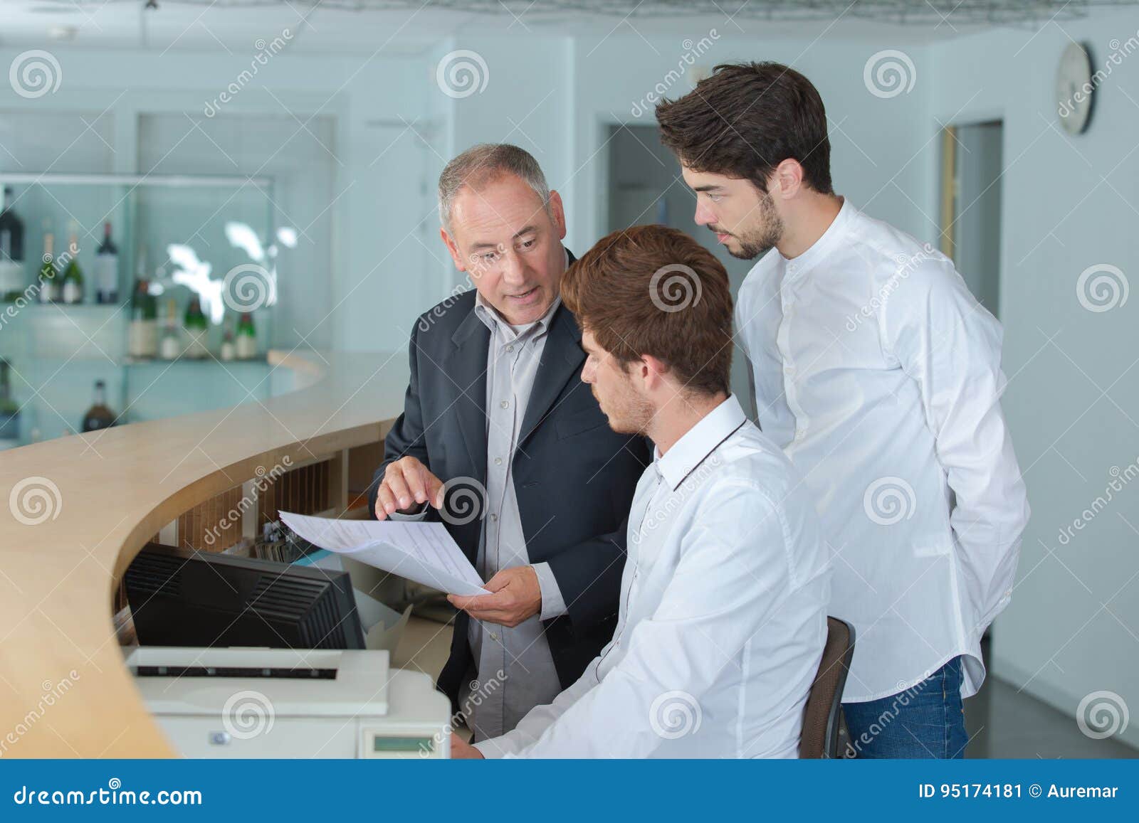 Manager Explaining Something To Employee in Reception Stock Image ...