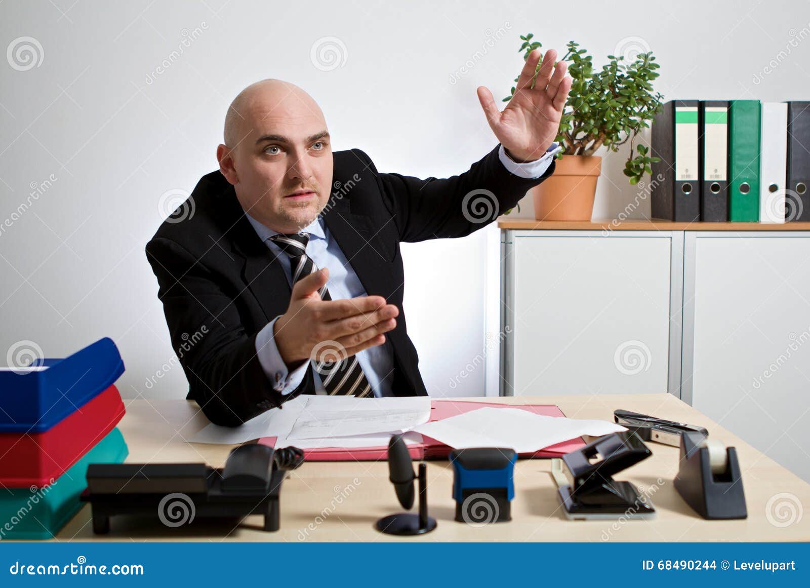 Manager Explains with Hectic Gestures a Situation Stock Photo - Image ...