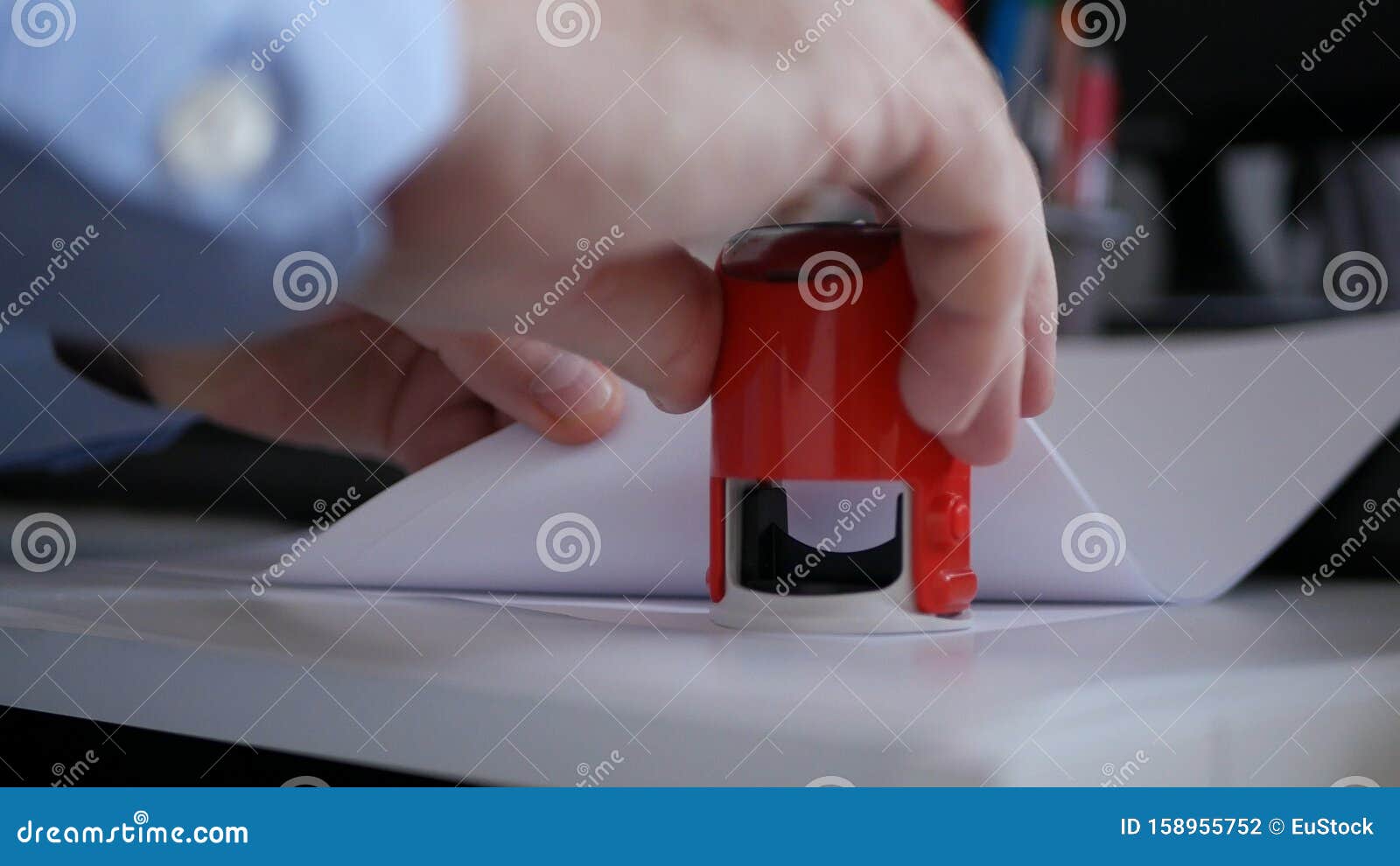 Manager Hand Stamping Papers and Documents Using a Rubber Stamp Stock ...
