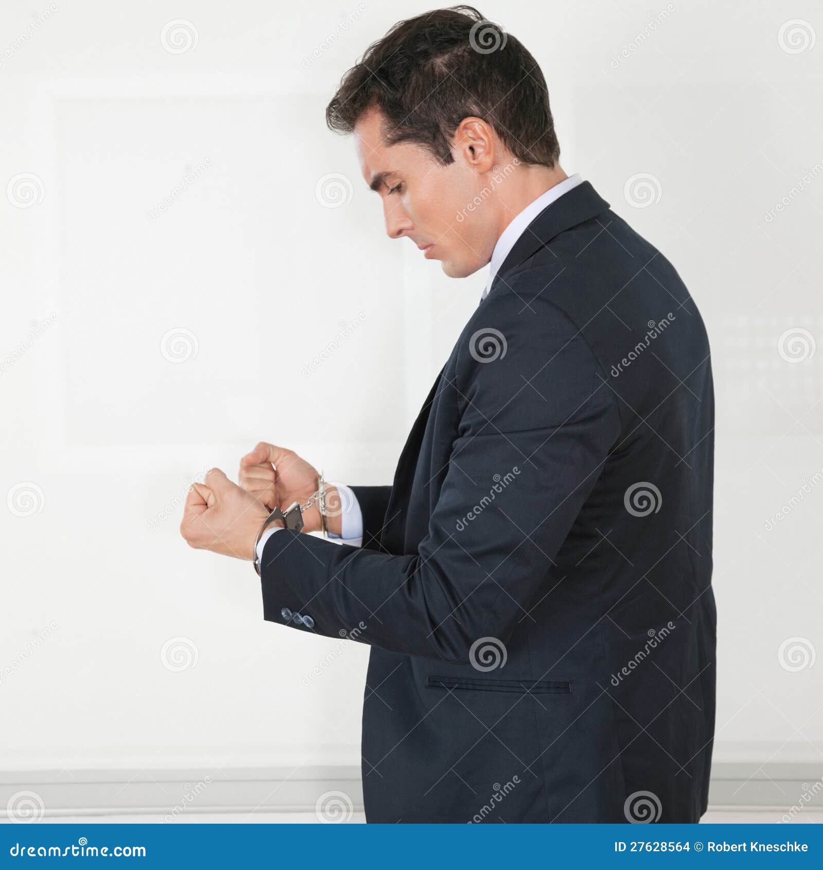 Manager in handcuffs stock photo. Image of guilty, suit - 27628564