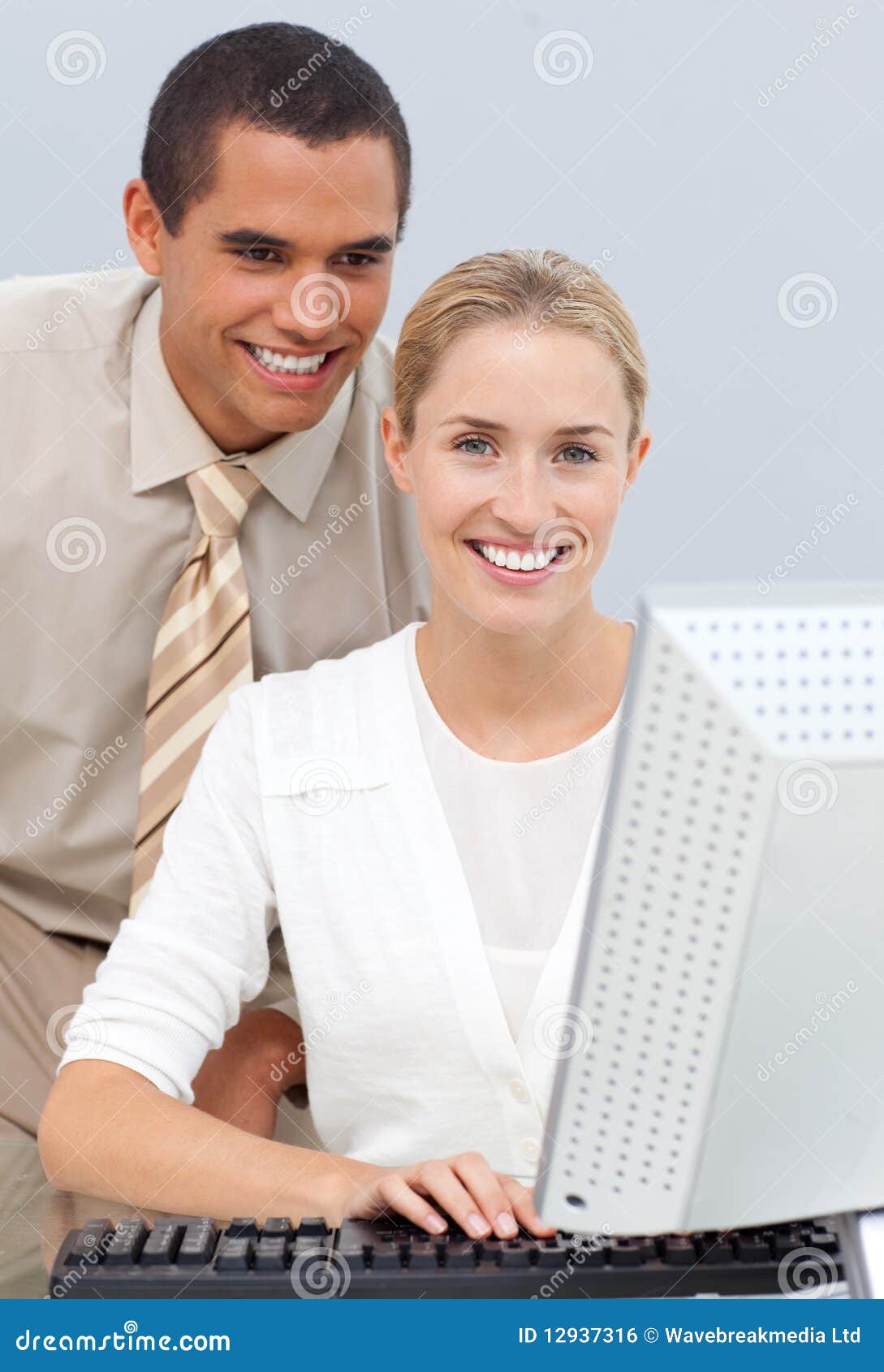 Manager Helping a Businesswoman with Her Computer Stock Photo - Image ...