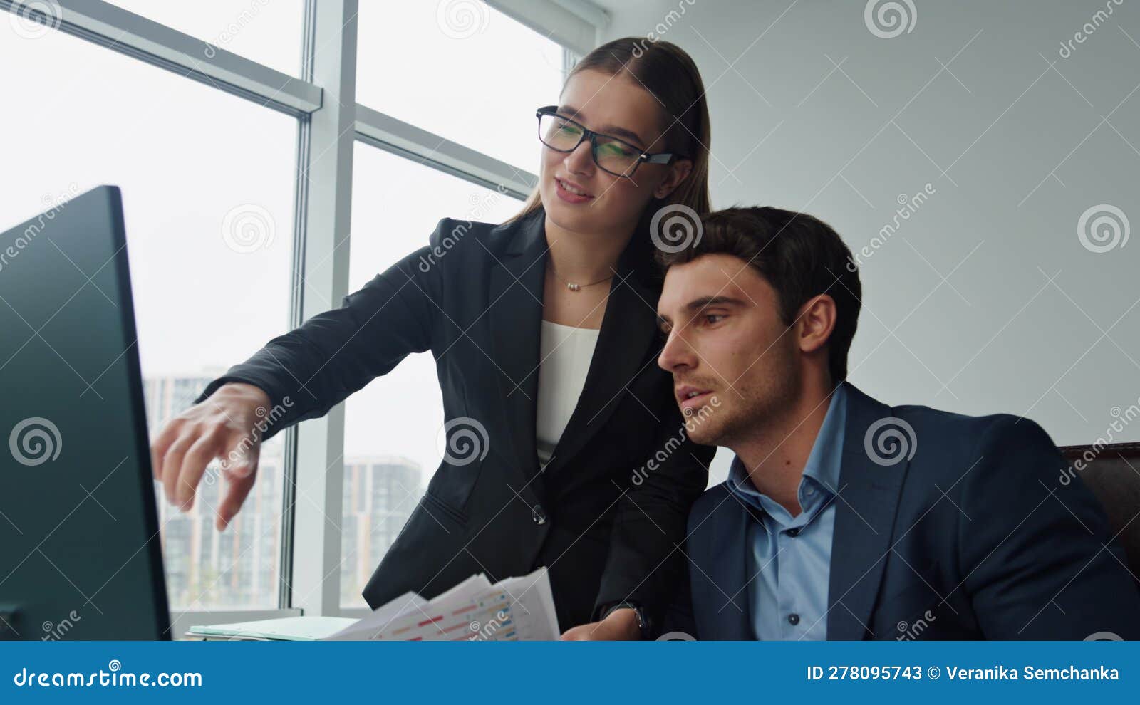 Manager Helping Office Employee Analysing Financial Data. Friendly ...