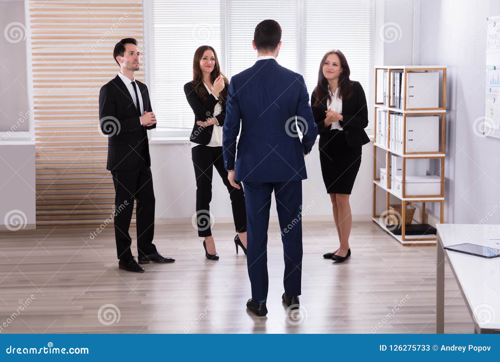 Manager In Huddle With Womens Football Team Giving Motivational Pep ...