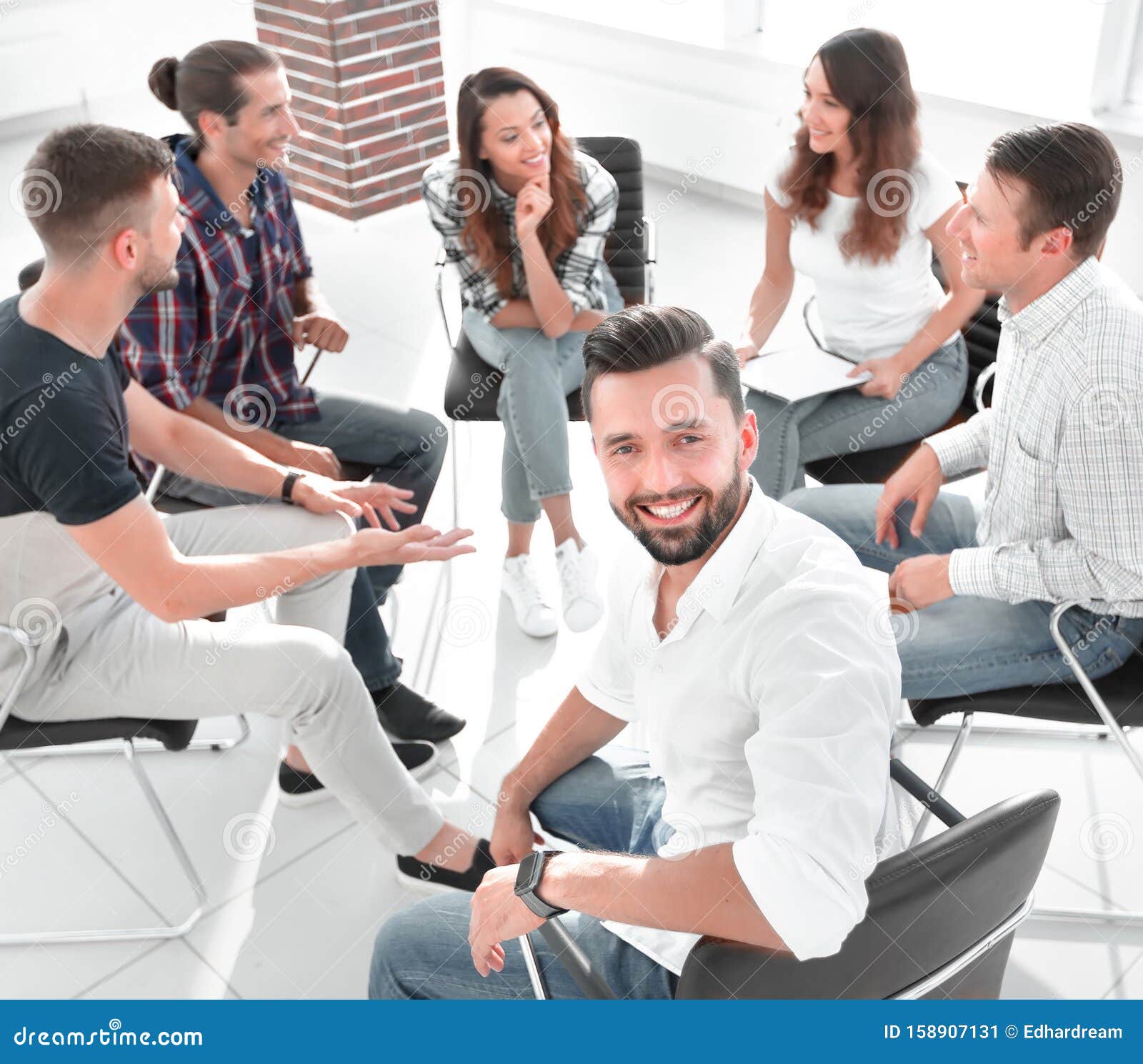 Manager and His Team Sitting in the Office Stock Image - Image of ...