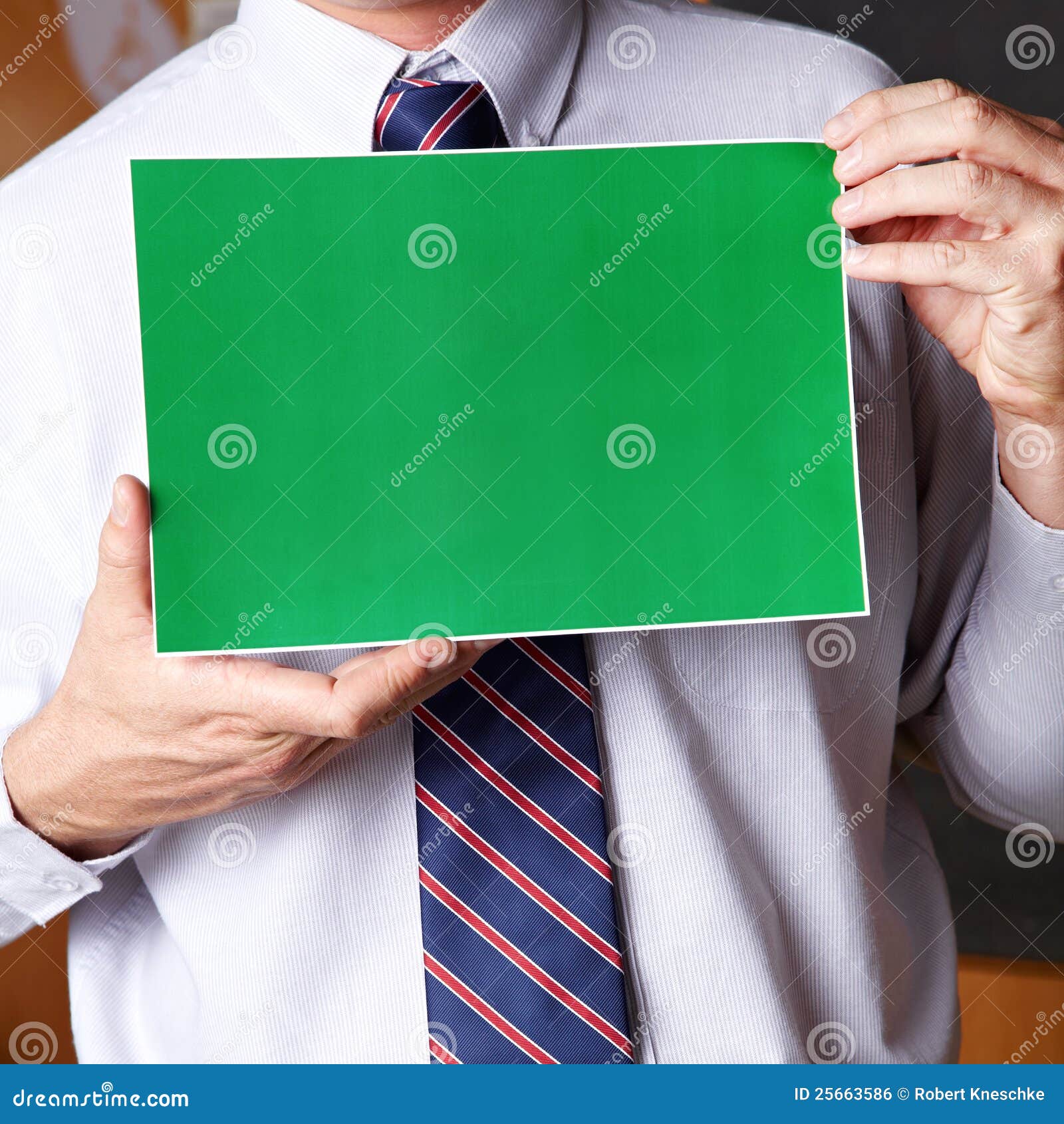 Manager holding green sign stock photo. Image of male - 25663586