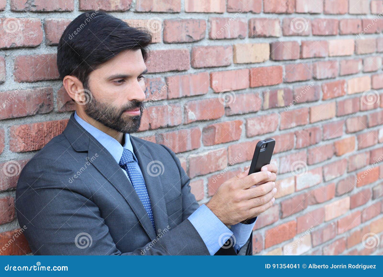 Manager Holding Smartphone, Texting Outside in the Street Stock Image ...