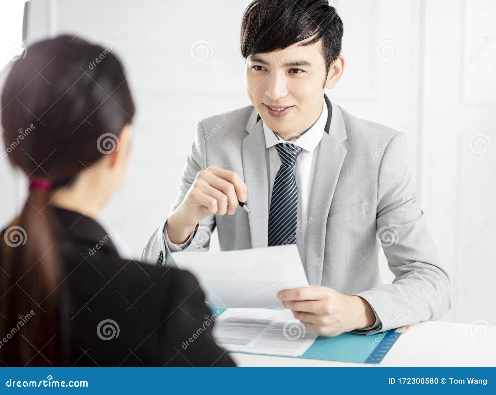 Manager Interviewing a Young Businesswoman in Office Stock Photo ...