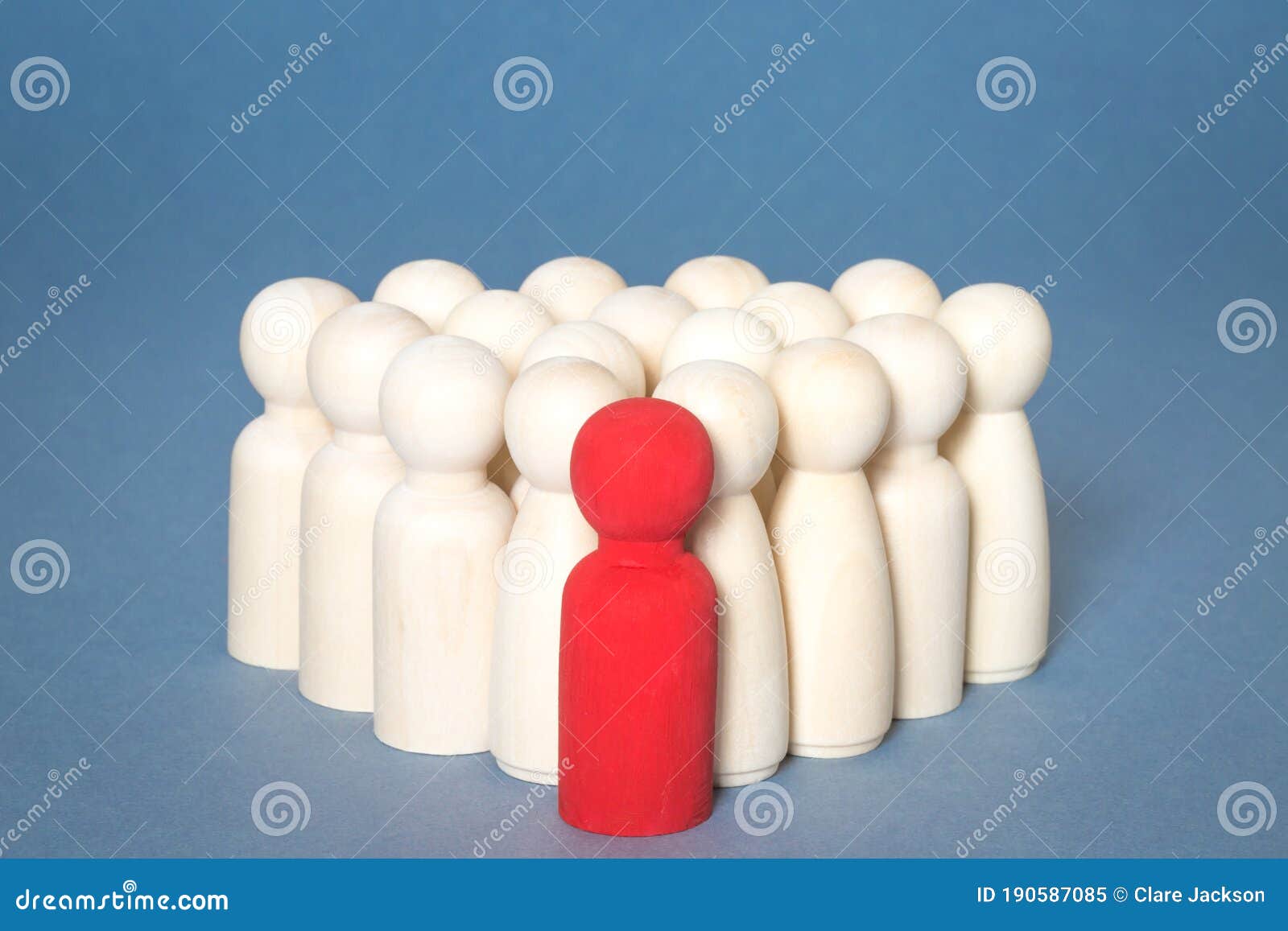 A Manager or Leader Standing Out Infront of a Group of People Stock ...