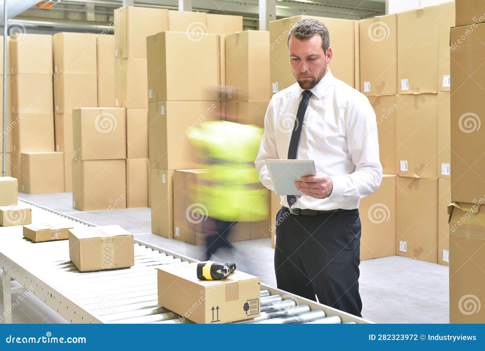 Manager of a Logistics Company Trading in a Warehouse Stock Photo ...