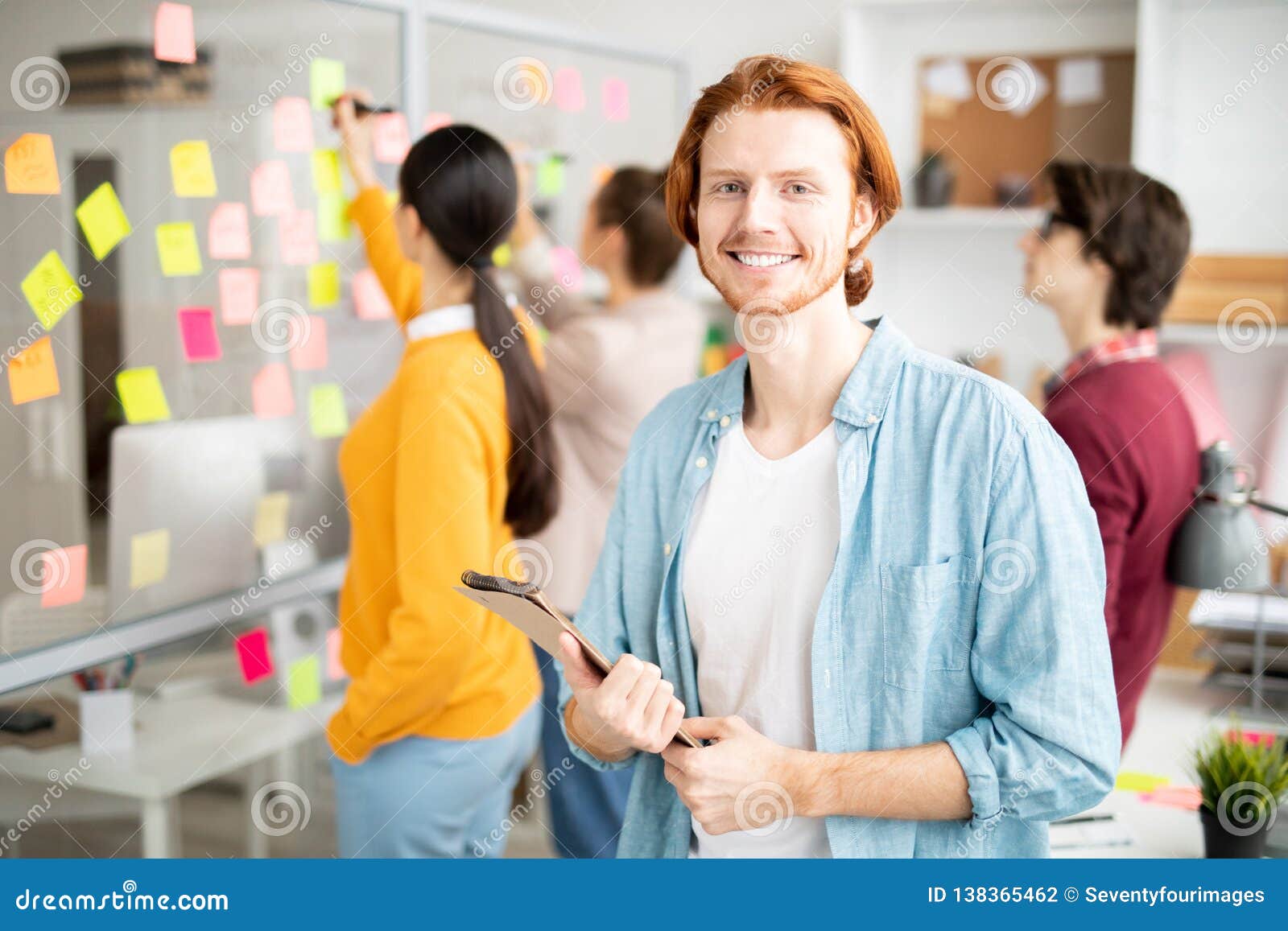 Manager with notepad stock photo. Image of businessman - 138365462