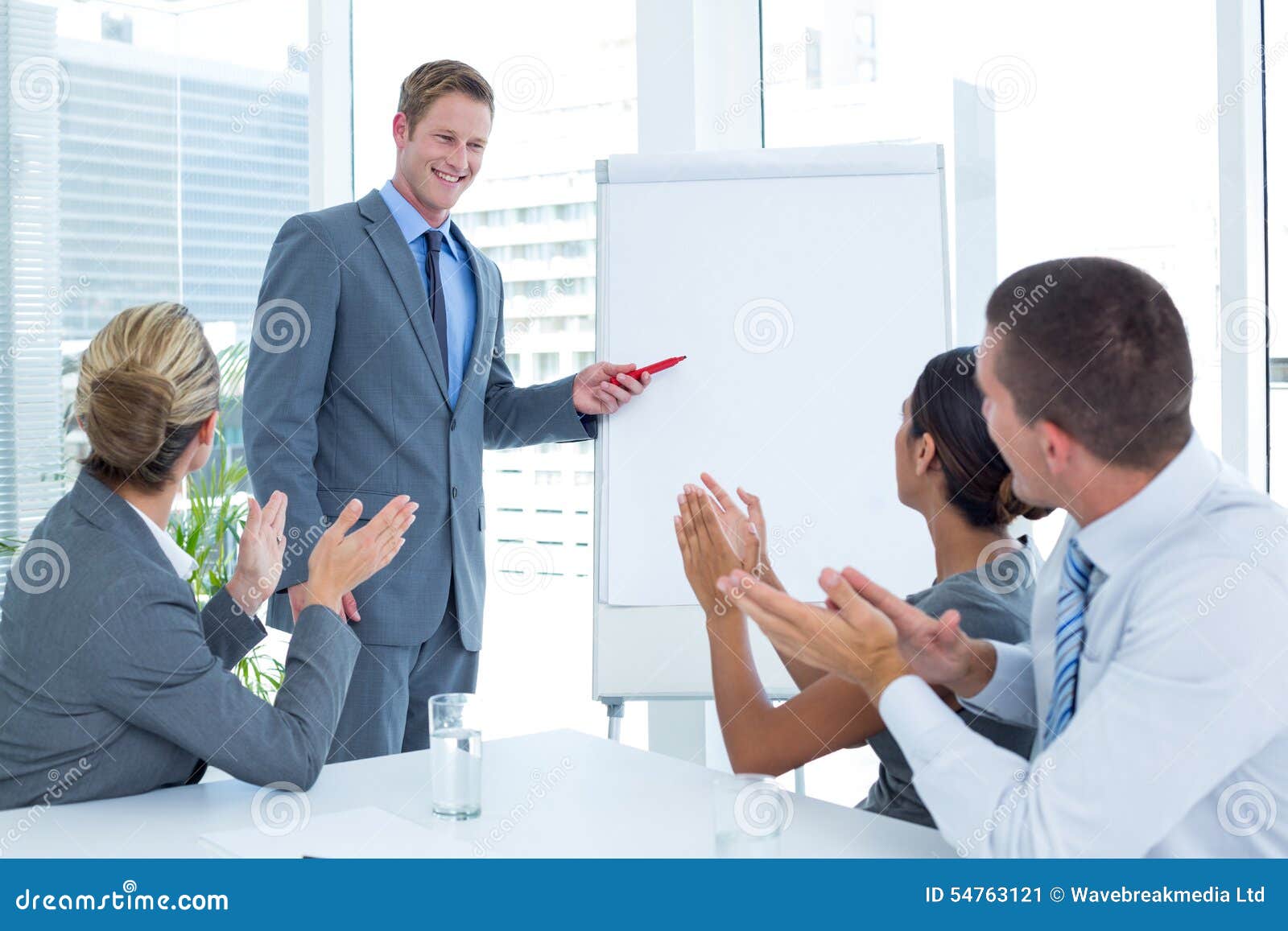 Manager Presenting Whiteboard To His Colleagues Stock Image - Image of ...