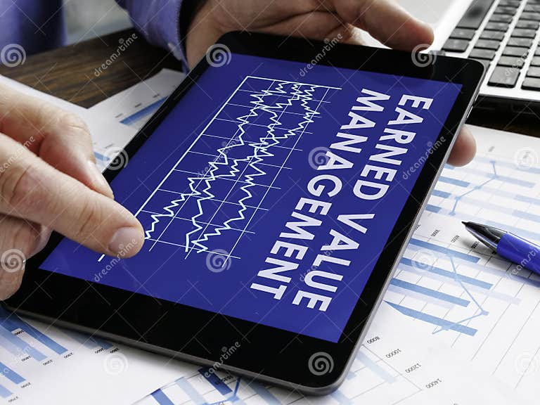 Manager Reads Earned Value Management EVM Report. Stock Image - Image ...