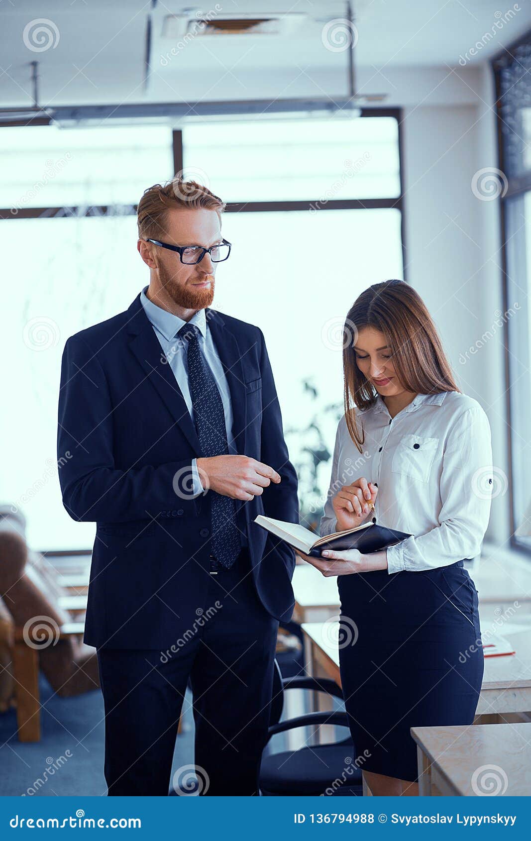 Manager and Secretary with Notepad in the Office Stock Photo - Image of ...