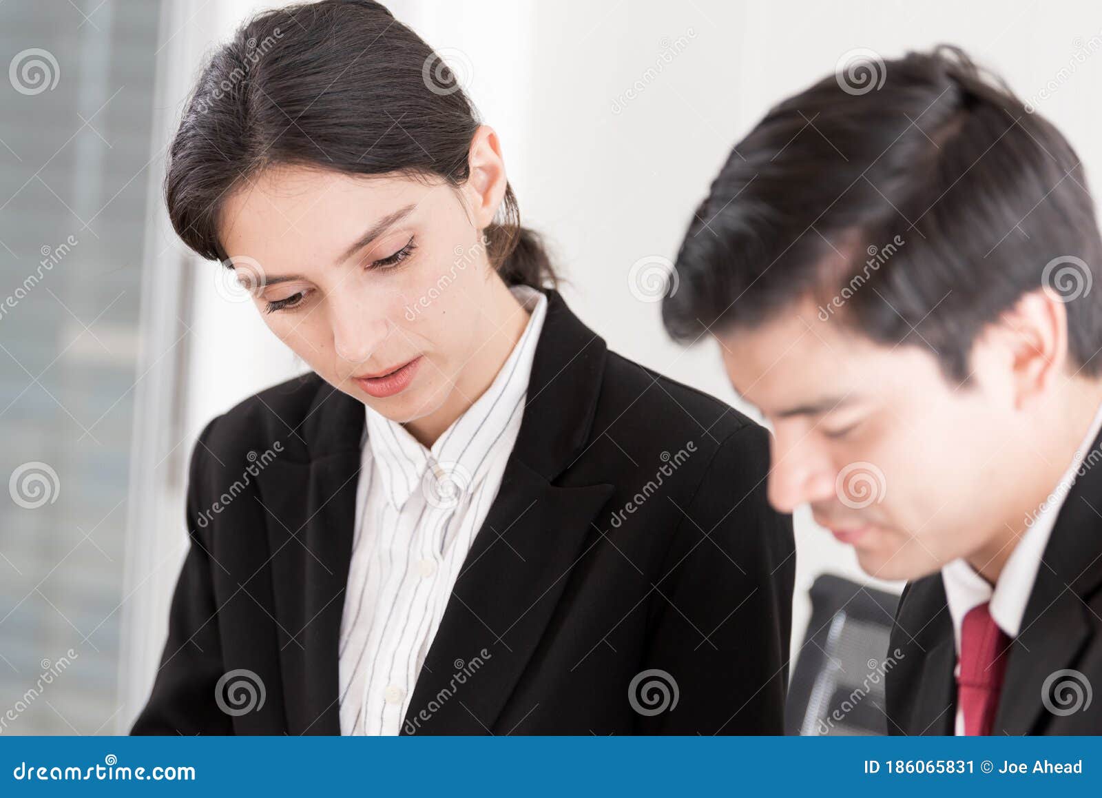 A Manager and Secretary Working Together in the Office Stock Image ...