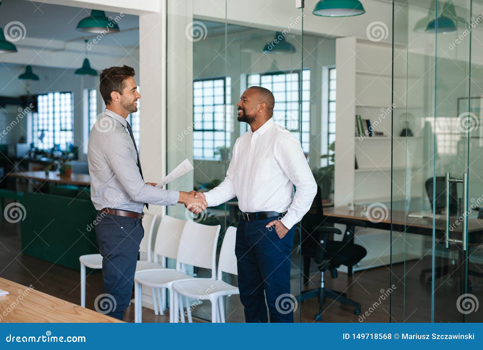 Manager Shaking Hands with a Job Applicant after an Interview Stock ...