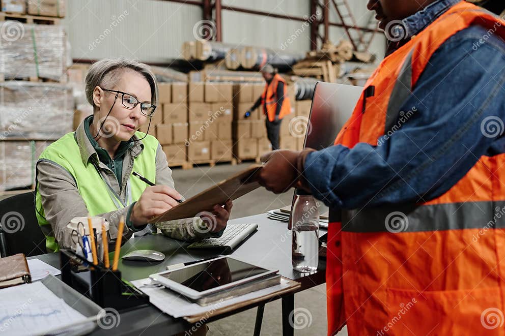 Manager Signing Delivery Documents in Warehouse Stock Image - Image of ...