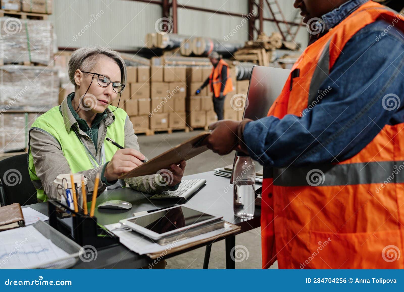 Manager Signing Delivery Documents in Warehouse Stock Photo - Image of ...