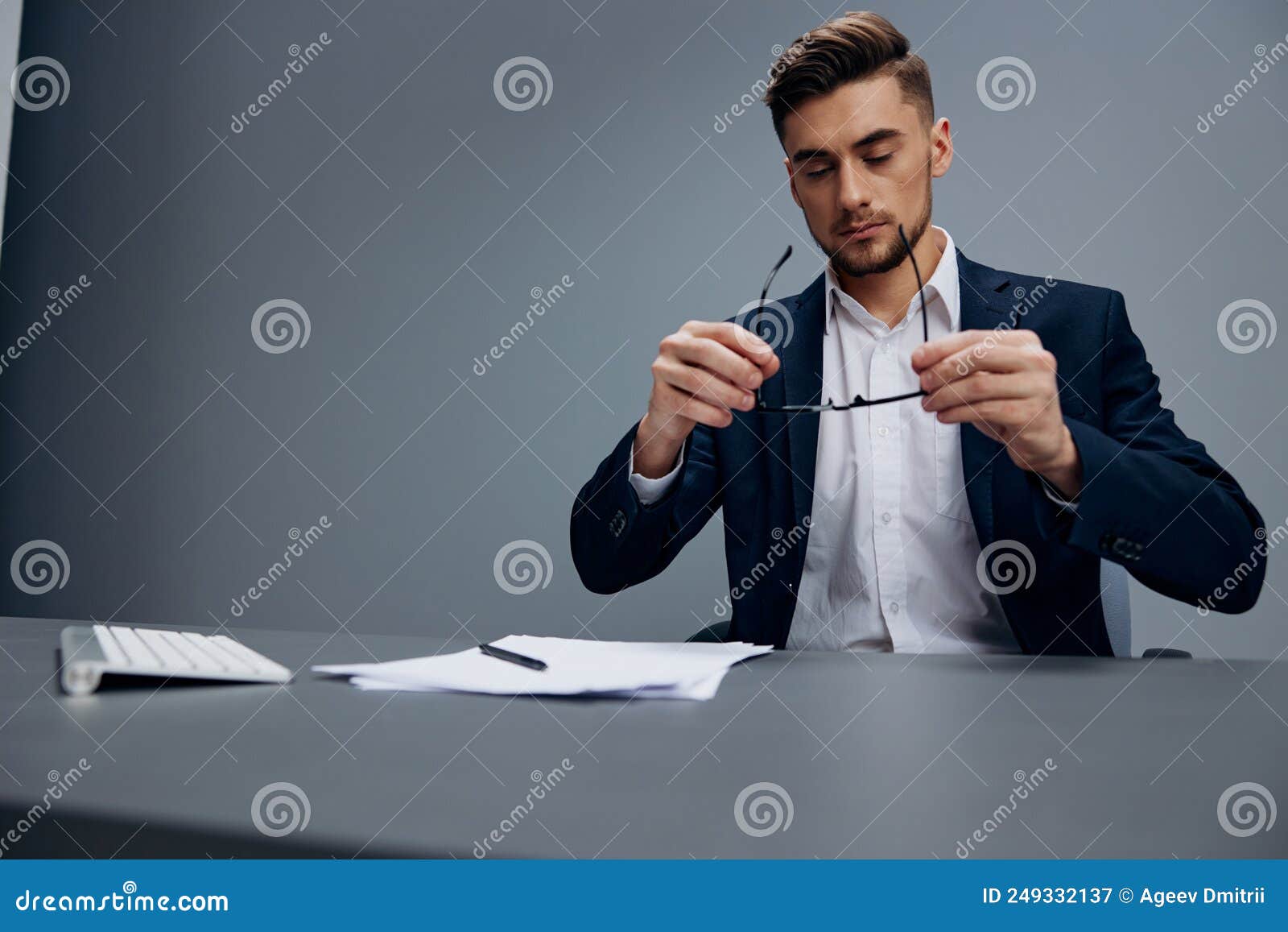 Manager Sitting at a Desk in Front of a Computer Background Stock Image ...