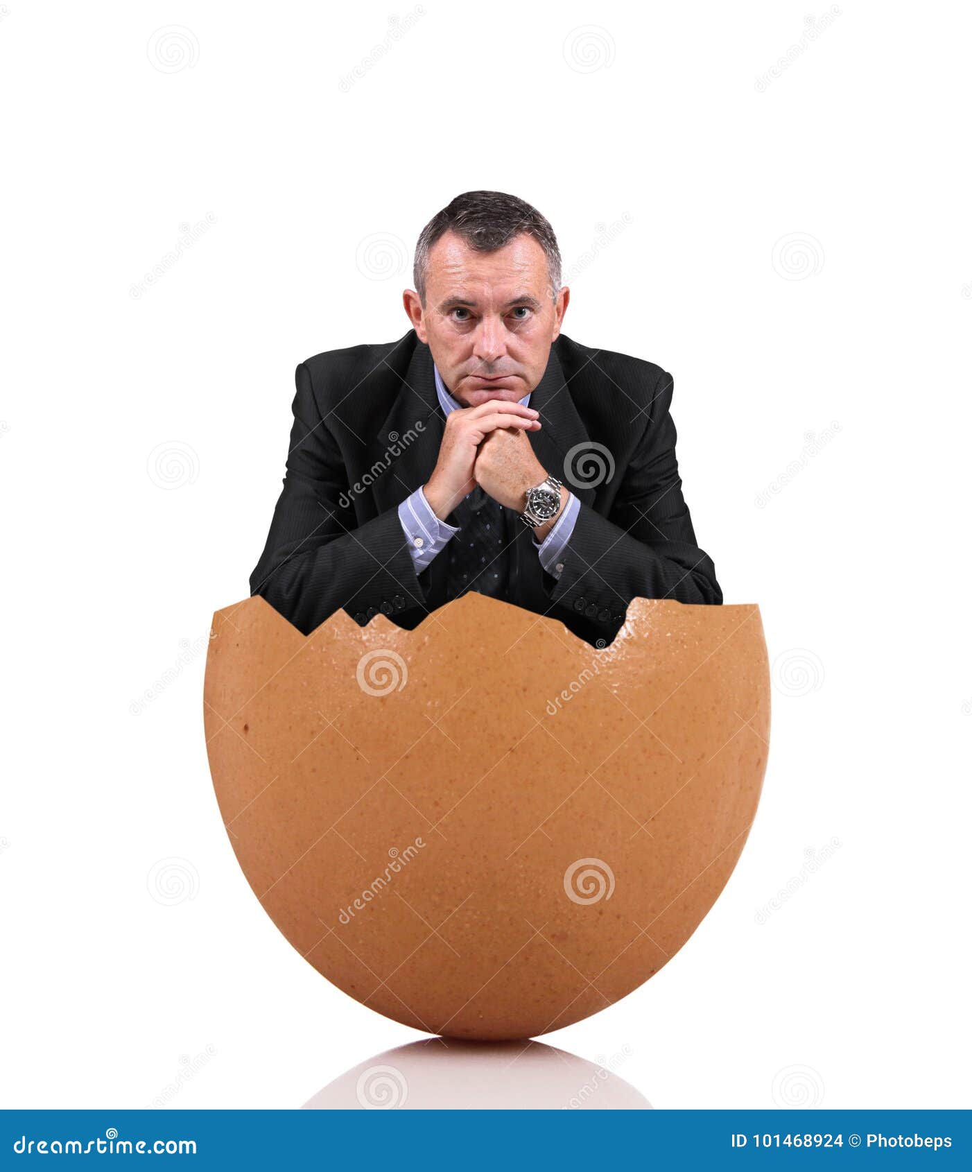 Man sitting into a egg stock photo. Image of concept - 101468924