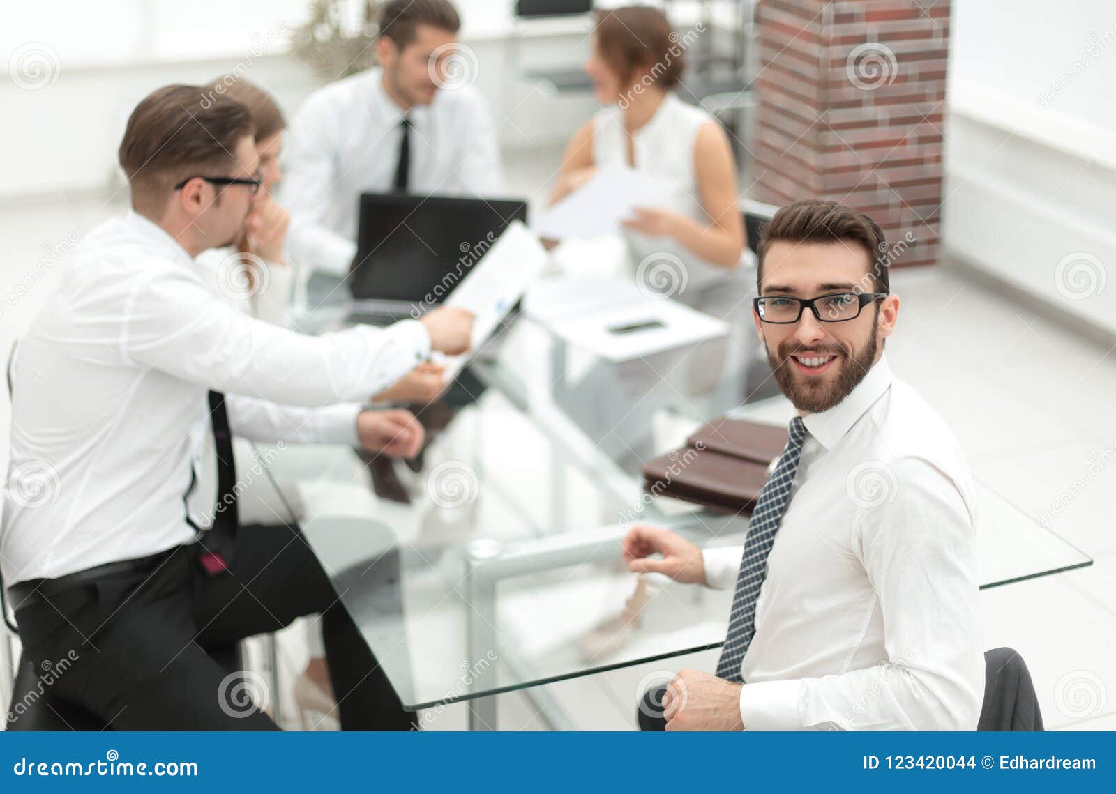 Manager Sitting at His Desk and Looking at the Camera Stock Photo ...