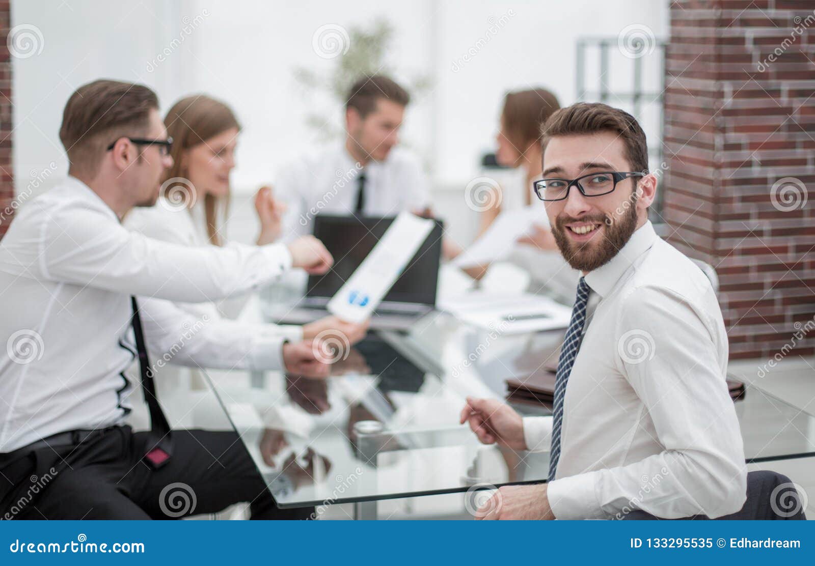 Manager Sitting at His Desk and Looking at the Camera Stock Image ...