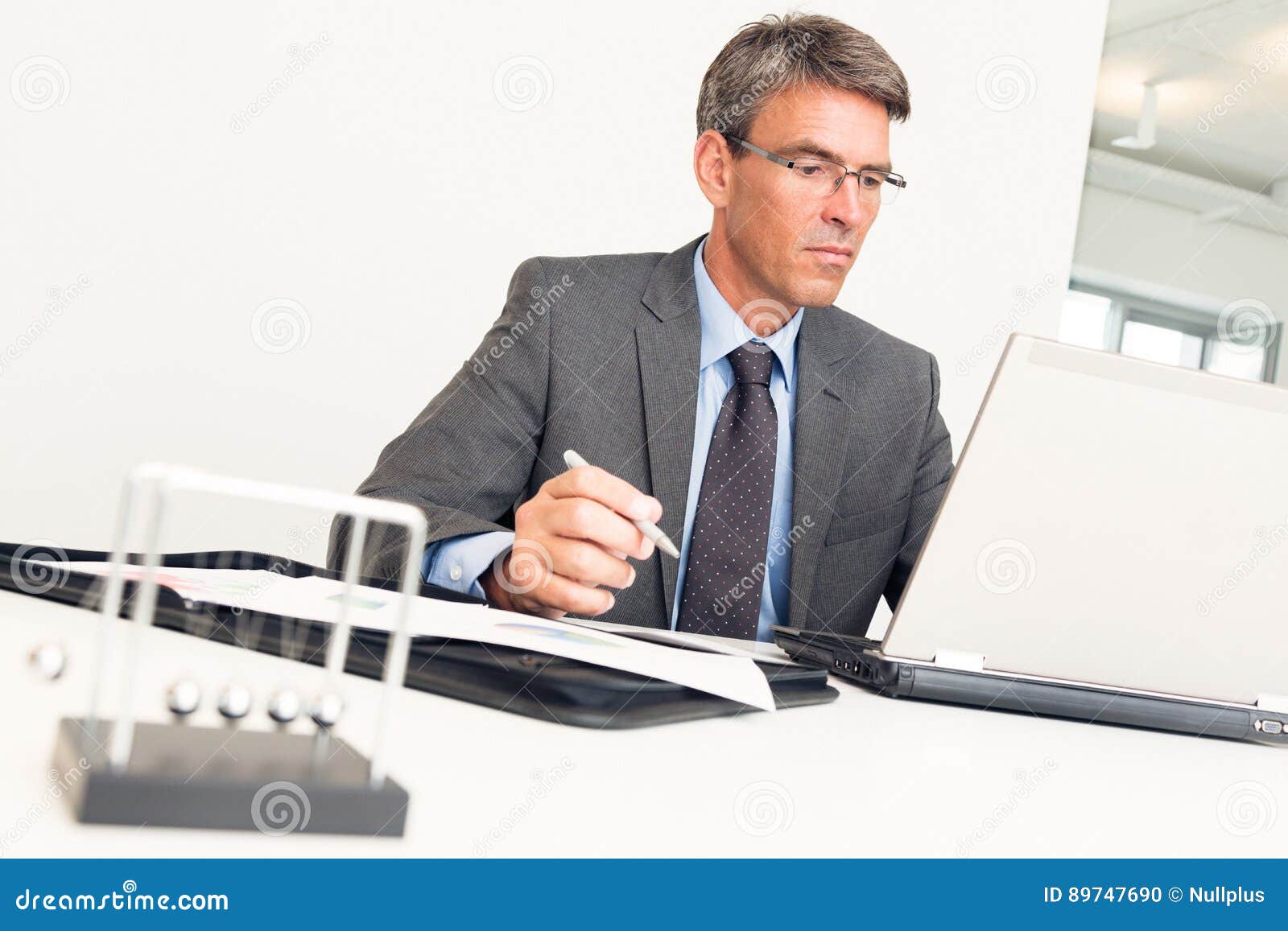 Manager Sitting at His Desk Stock Photo - Image of office, newton: 89747690