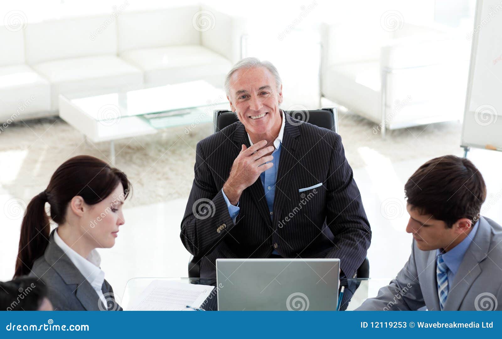Manager Smiling at the Camera in a Meeting Stock Image - Image of ...